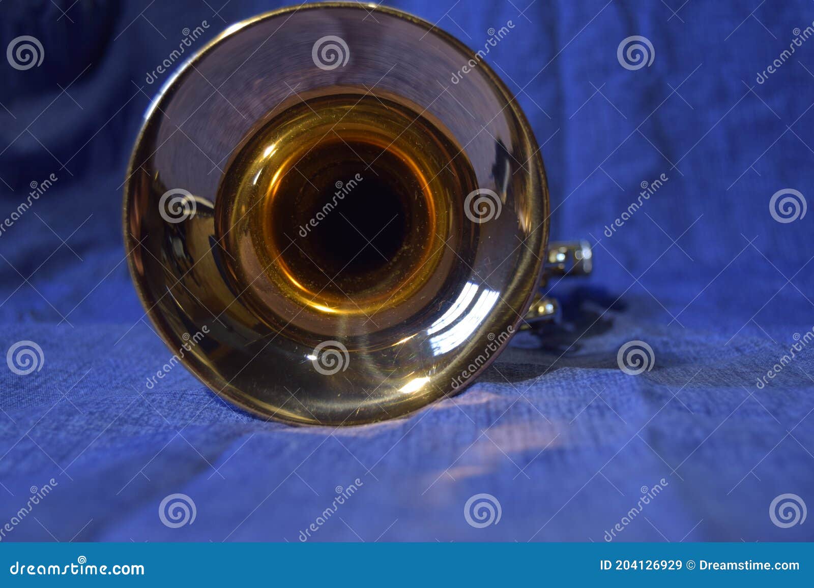 FRONT VIEW TRUMPET on BLUE FABRIC BACKGROUND Stock Image - Image of ...