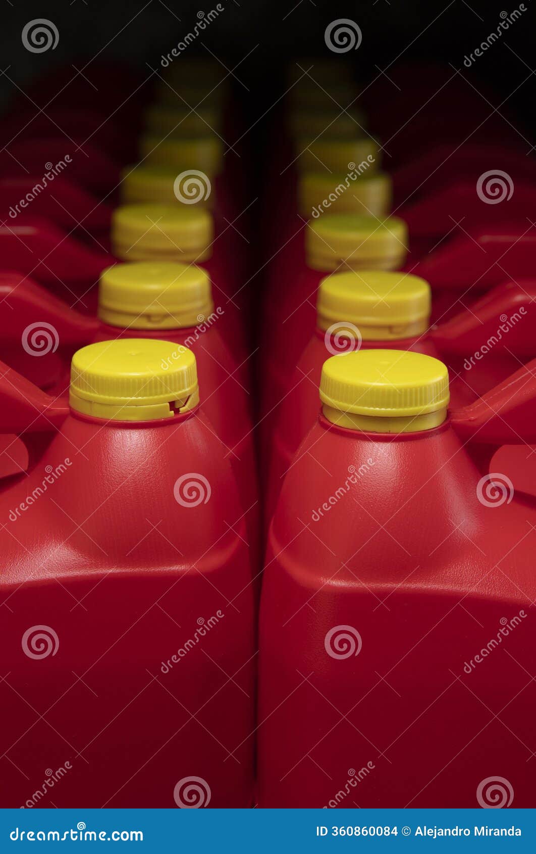 Front View of Two Columns of Red Plastic Motor Oil Bottles, Container ...