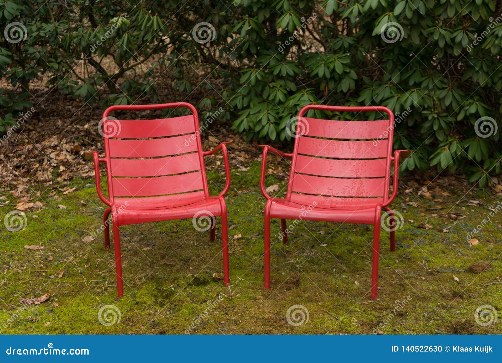 Front View of Two Red Chairs Inside a Park. Stock Photo - Image of ...