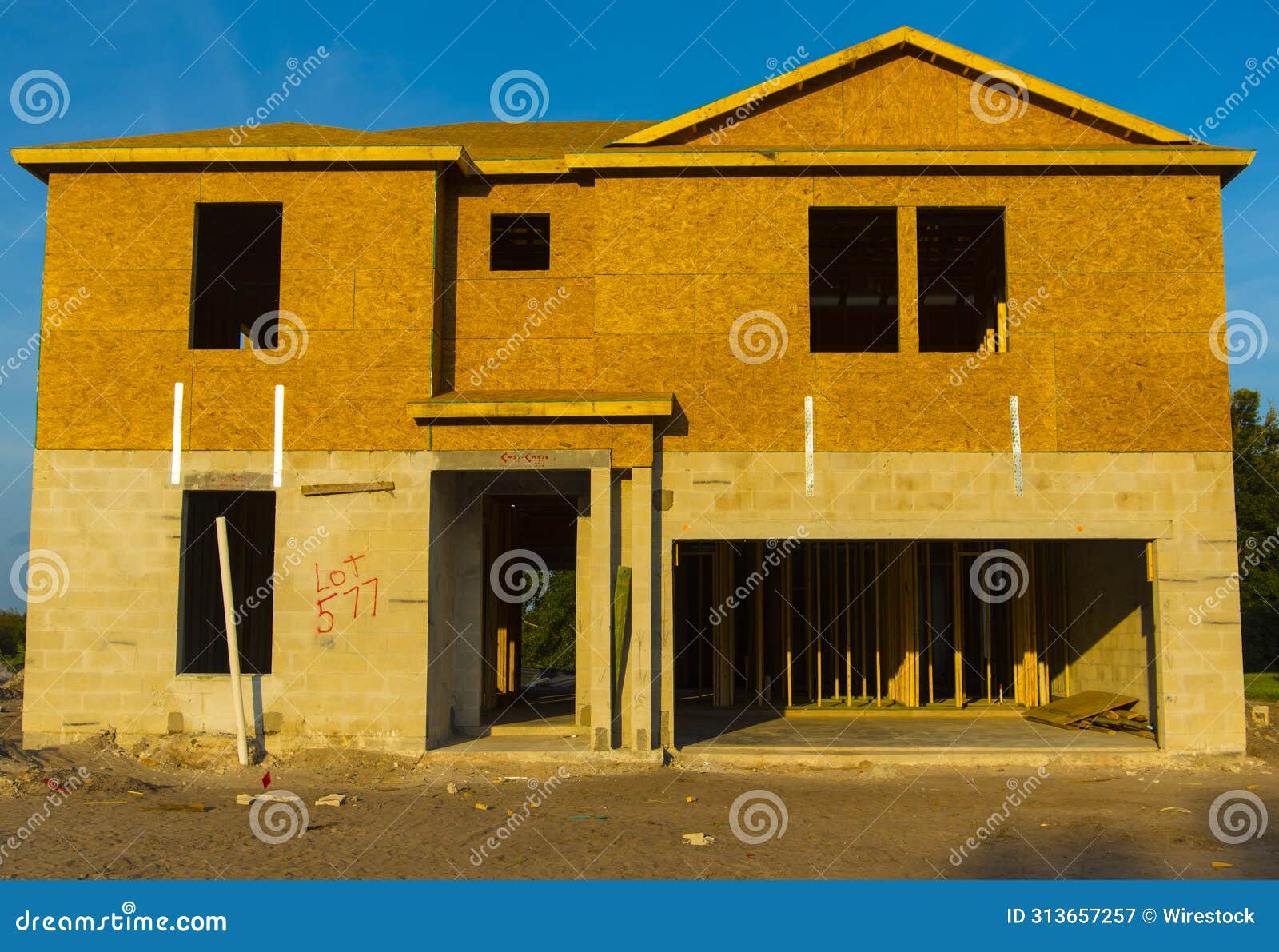 Front View of a Two-story Building in the Process of Being Constructed ...