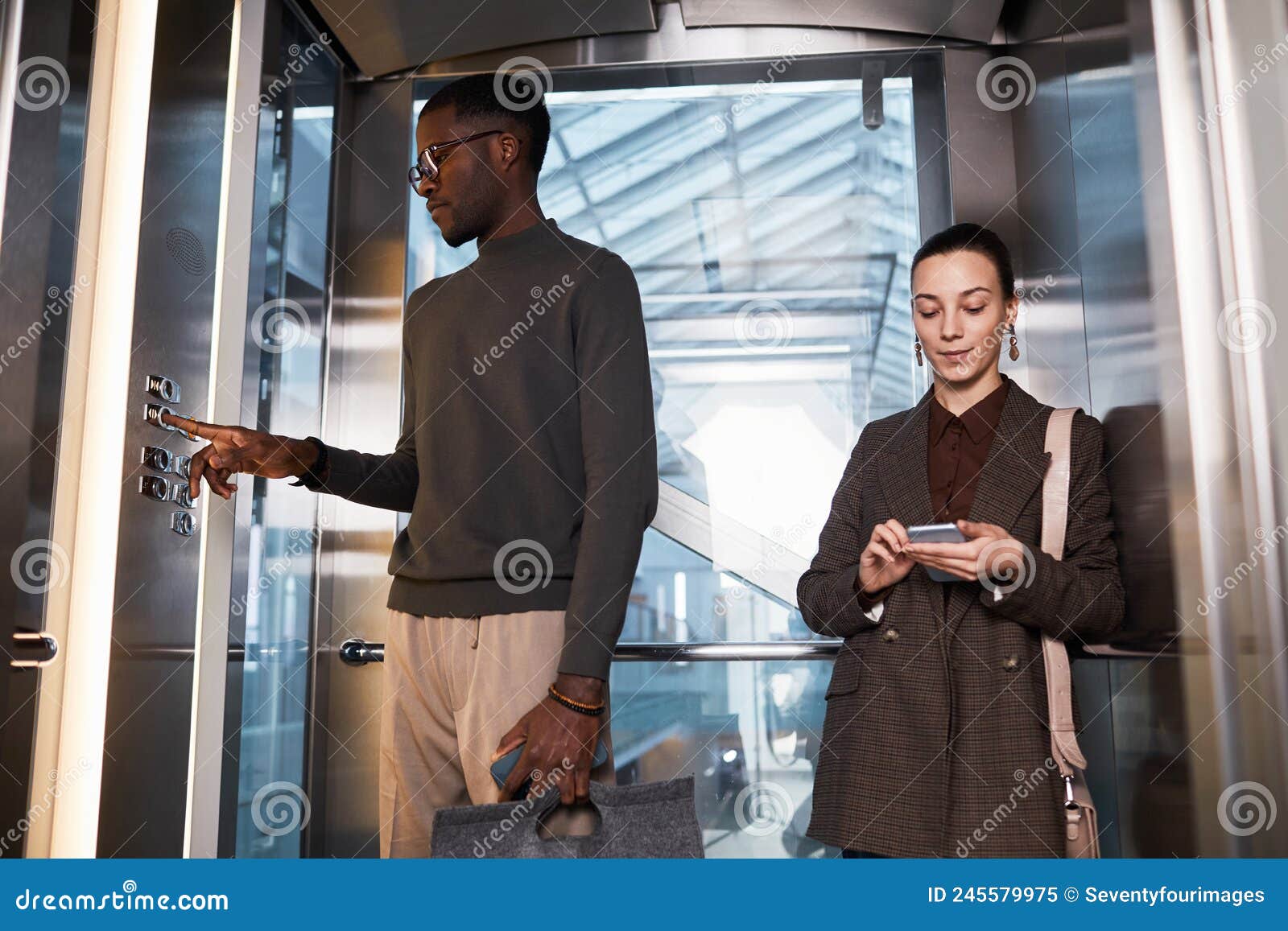 Colleagues in Office Elevator Stock Image - Image of colleague ...