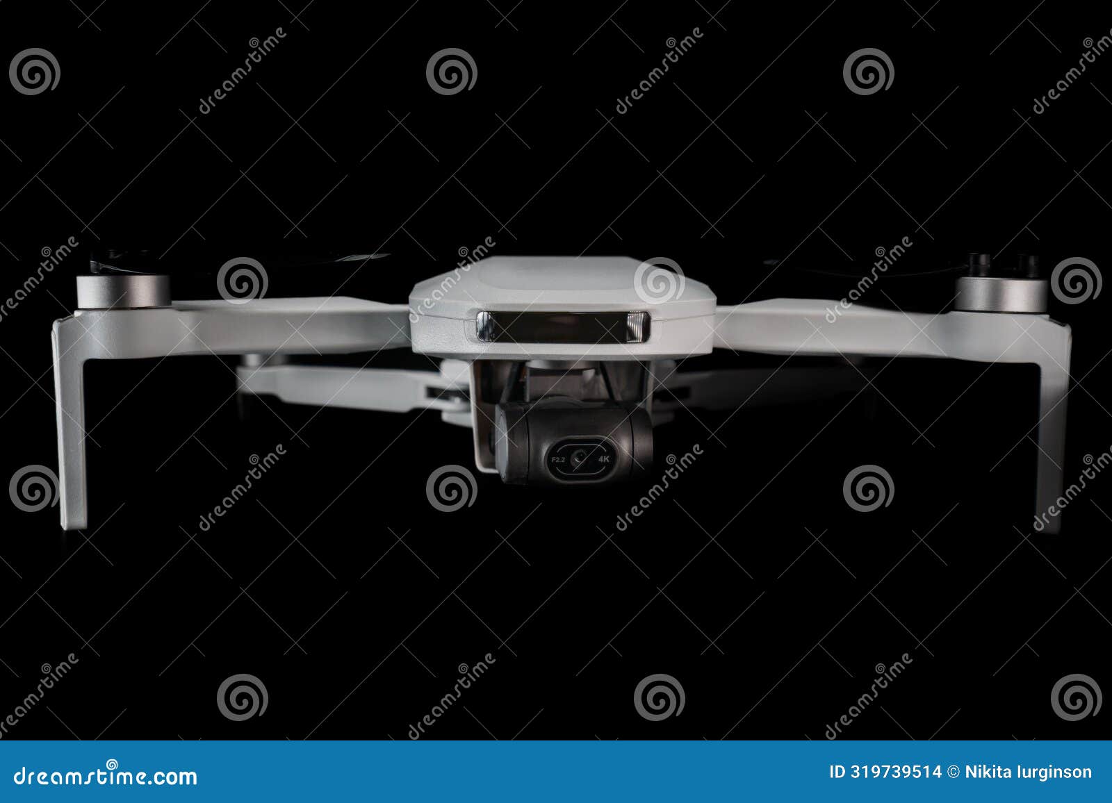 Front View of White Drone Against Black Background in Studio Lighting ...