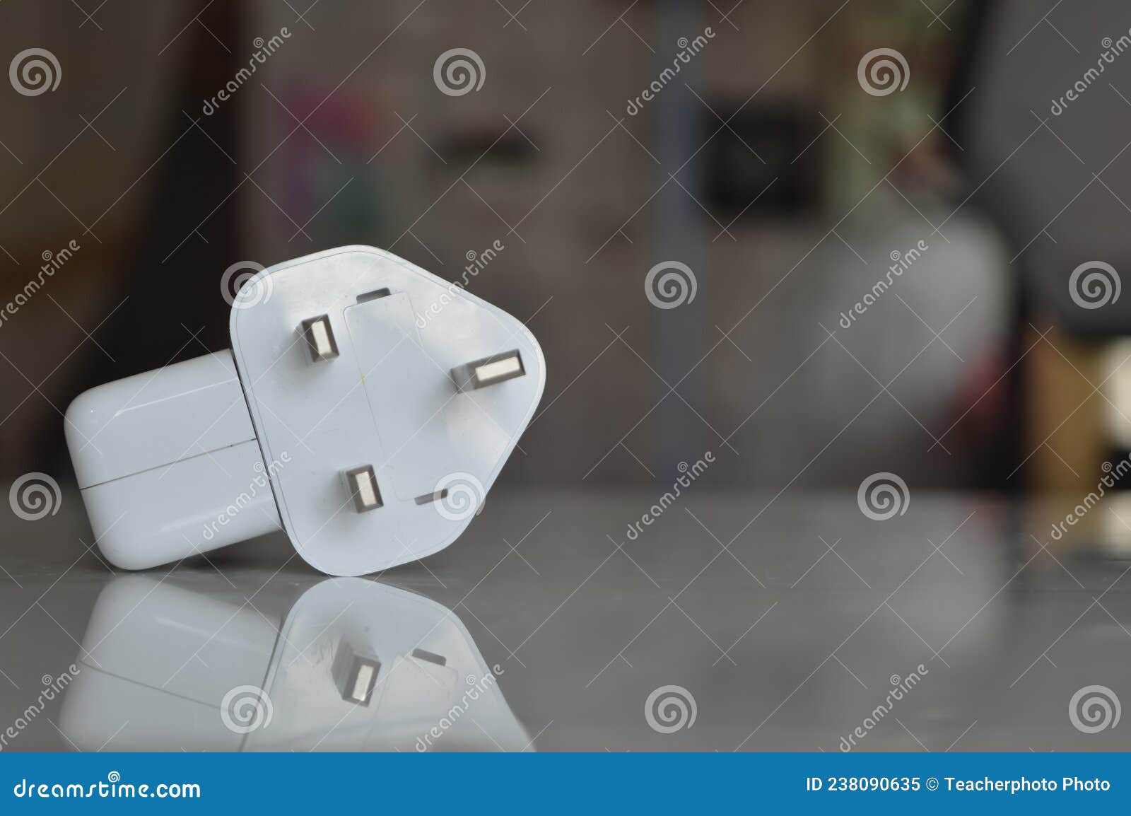 Front View of White Plug with Blurred Background Stock Image - Image of ...