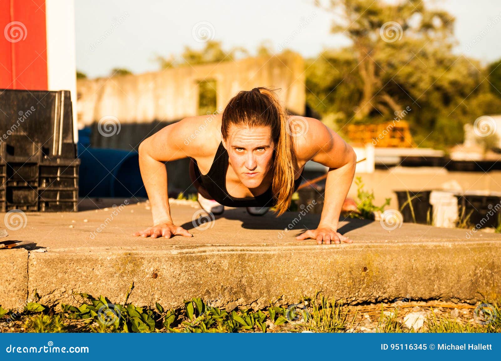 Front View of Woman Doing Pushups Outside Stock Image - Image of ...
