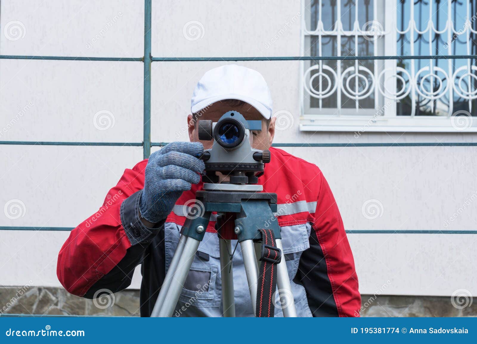 Front View of Worker in Red Workwear Looks in Engineering Level. Stock ...
