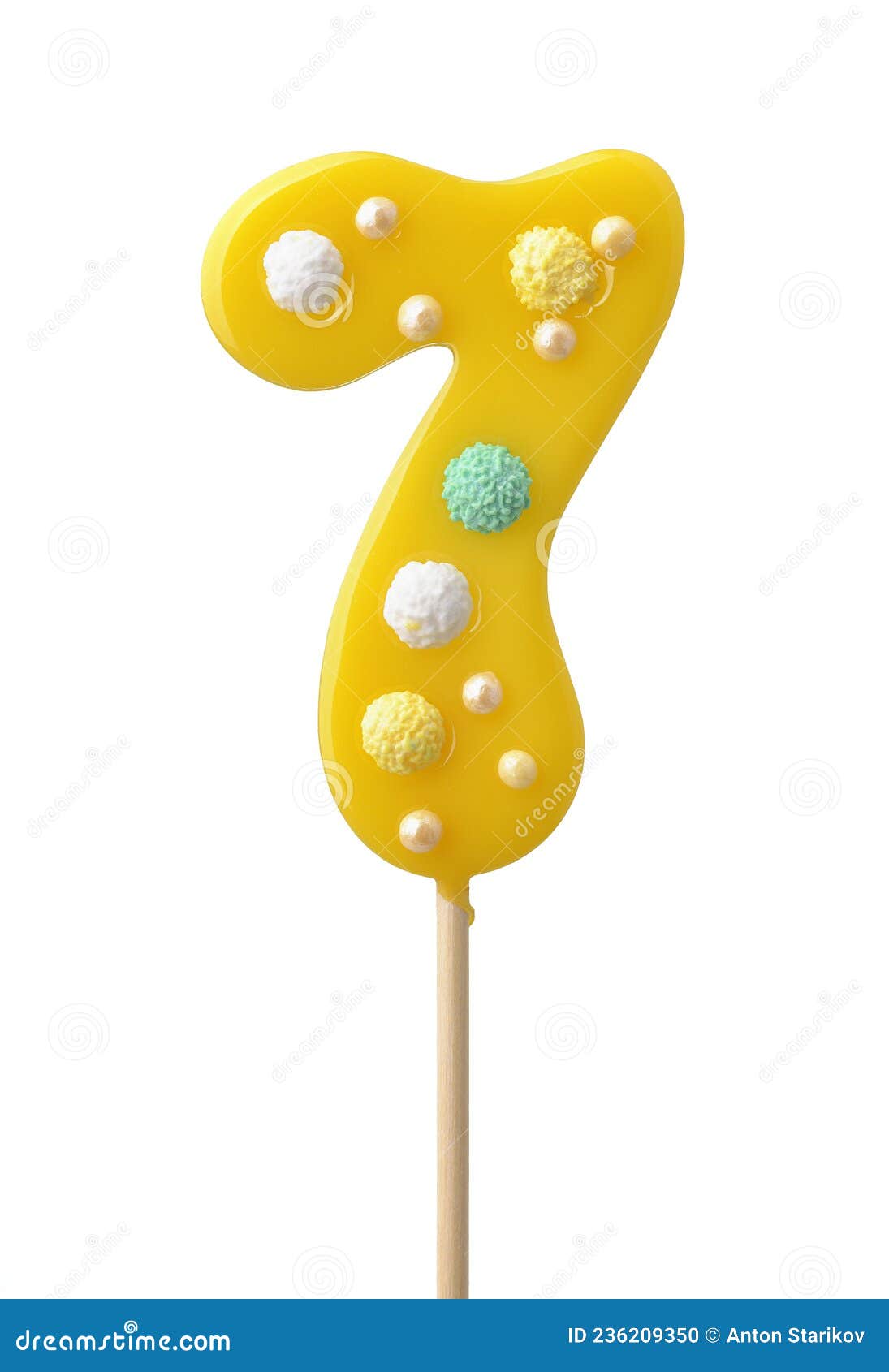 Front View of Yellow Handmade Number Seven Lollipop Stock Photo - Image ...