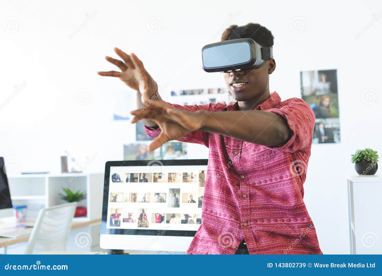 Graphic Designer Using Virtual Reality Headset in Office Stock Image ...