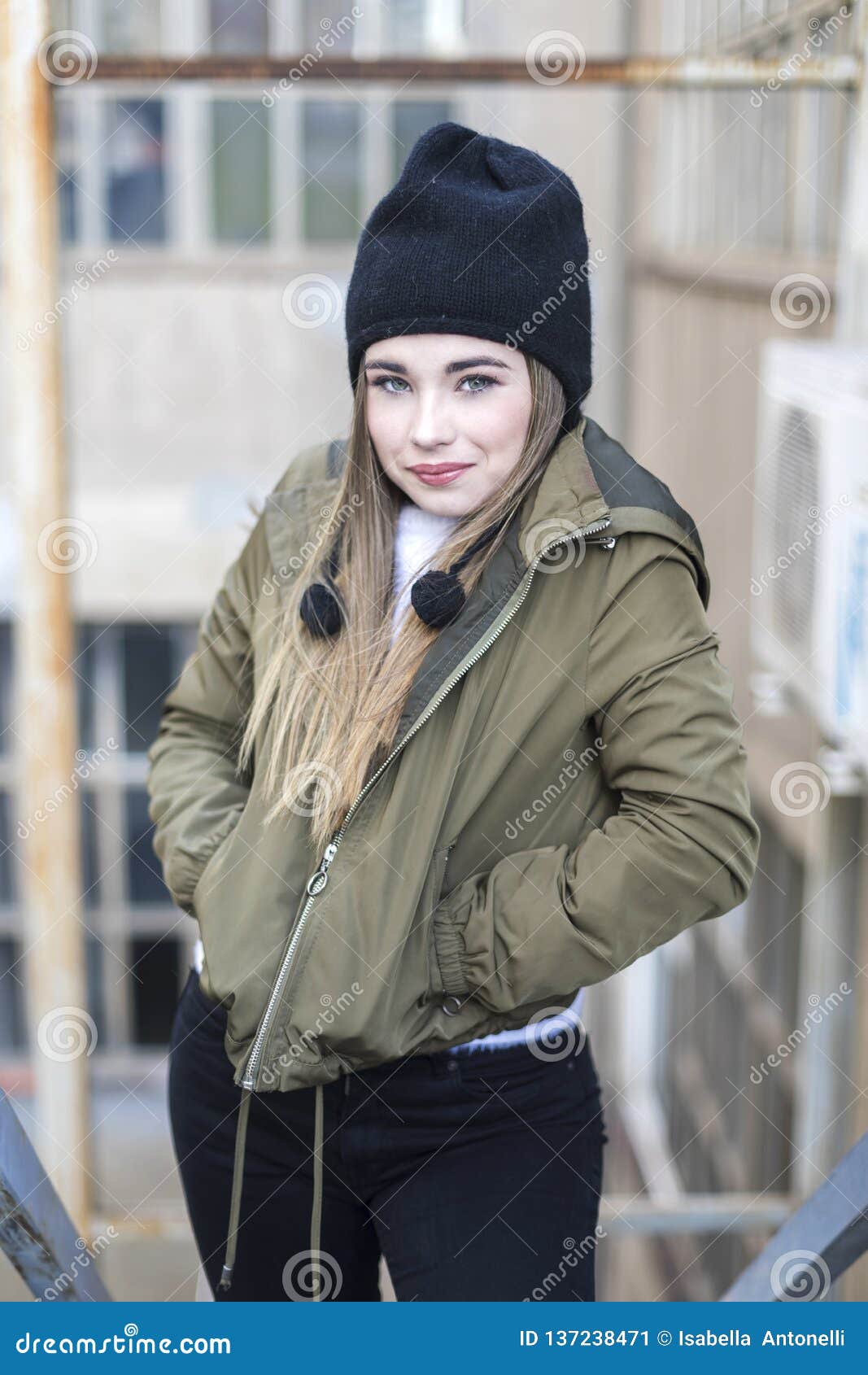 Front View of a Young Teen Standing Outdoors with Hands on Pocket Stock ...