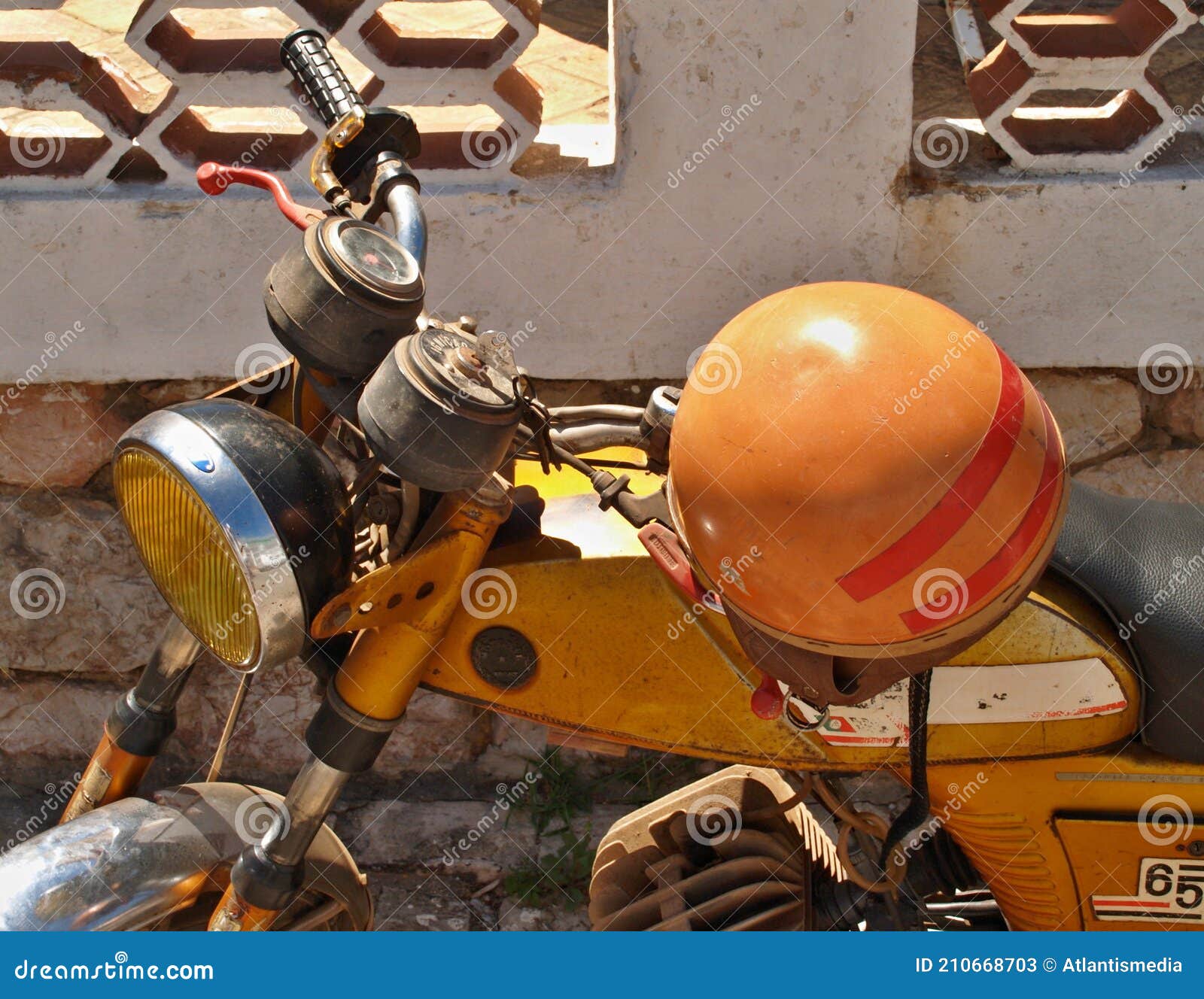 Old 60`s moped with helmet stock image. Image of moped - 210668703
