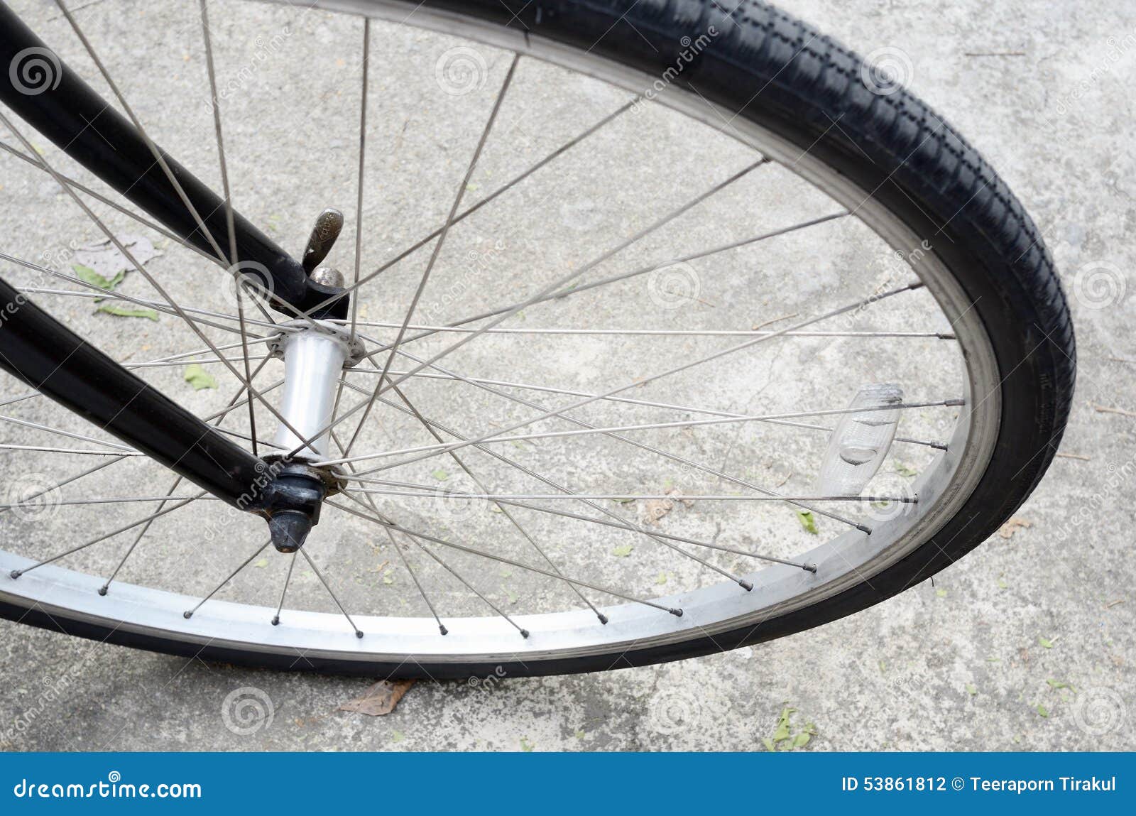 Front wheel of a bicycle stock photo. Image of ground - 53861812