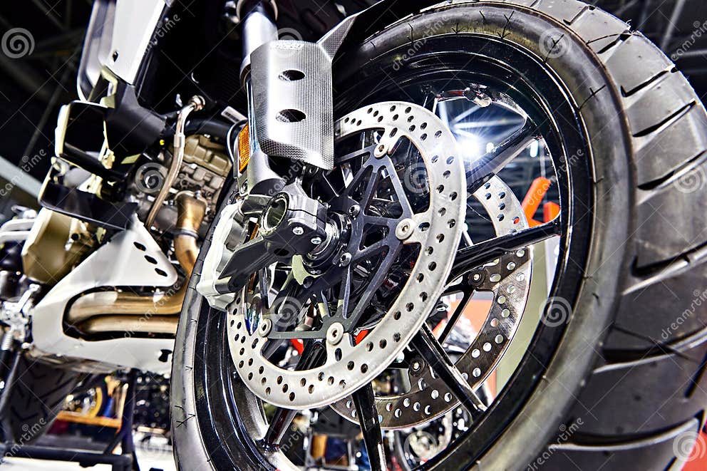 Front wheel of motorcycle editorial stock image. Image of speed - 321437354