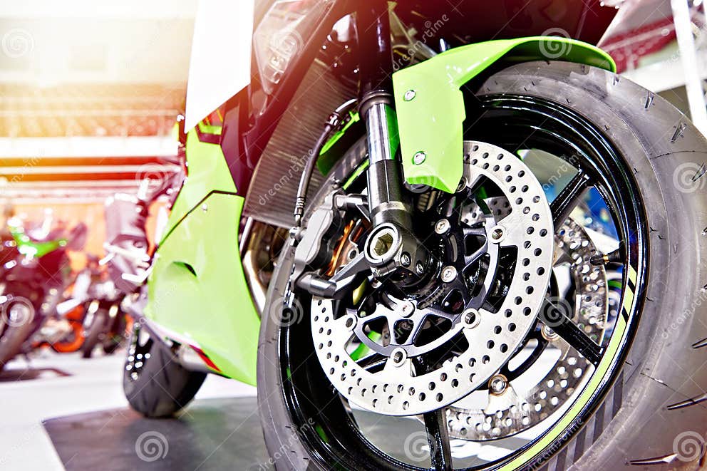 Front wheel of motorcycle stock photo. Image of spring - 338478228