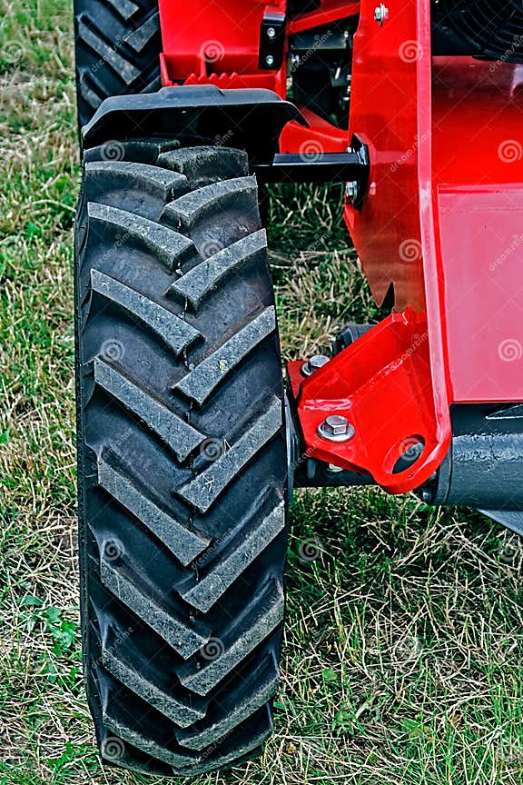 Front wheel of one tractor stock photo. Image of drill - 38152030