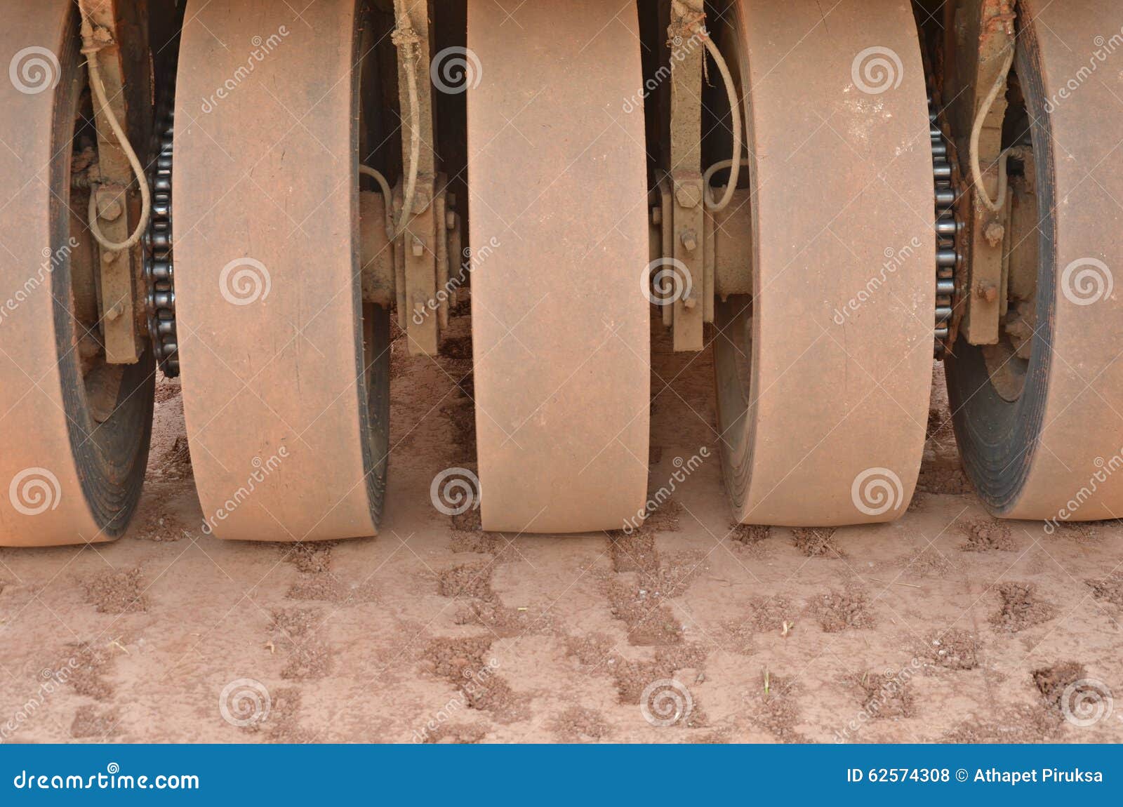 Front wheels of compactor stock photo. Image of seamless - 62574308