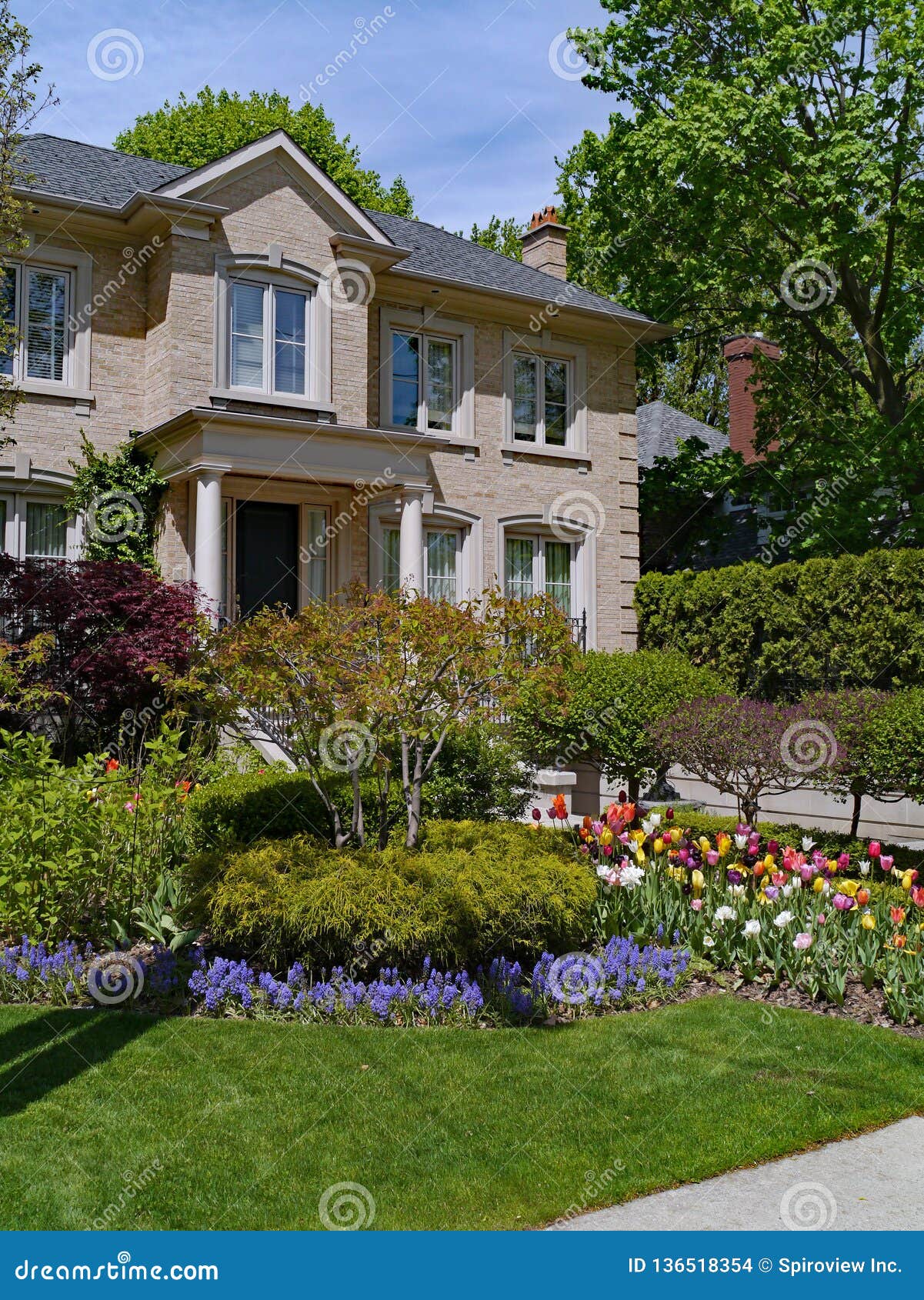 Front Yard with Spring Flowers Stock Photo - Image of facade, yard ...