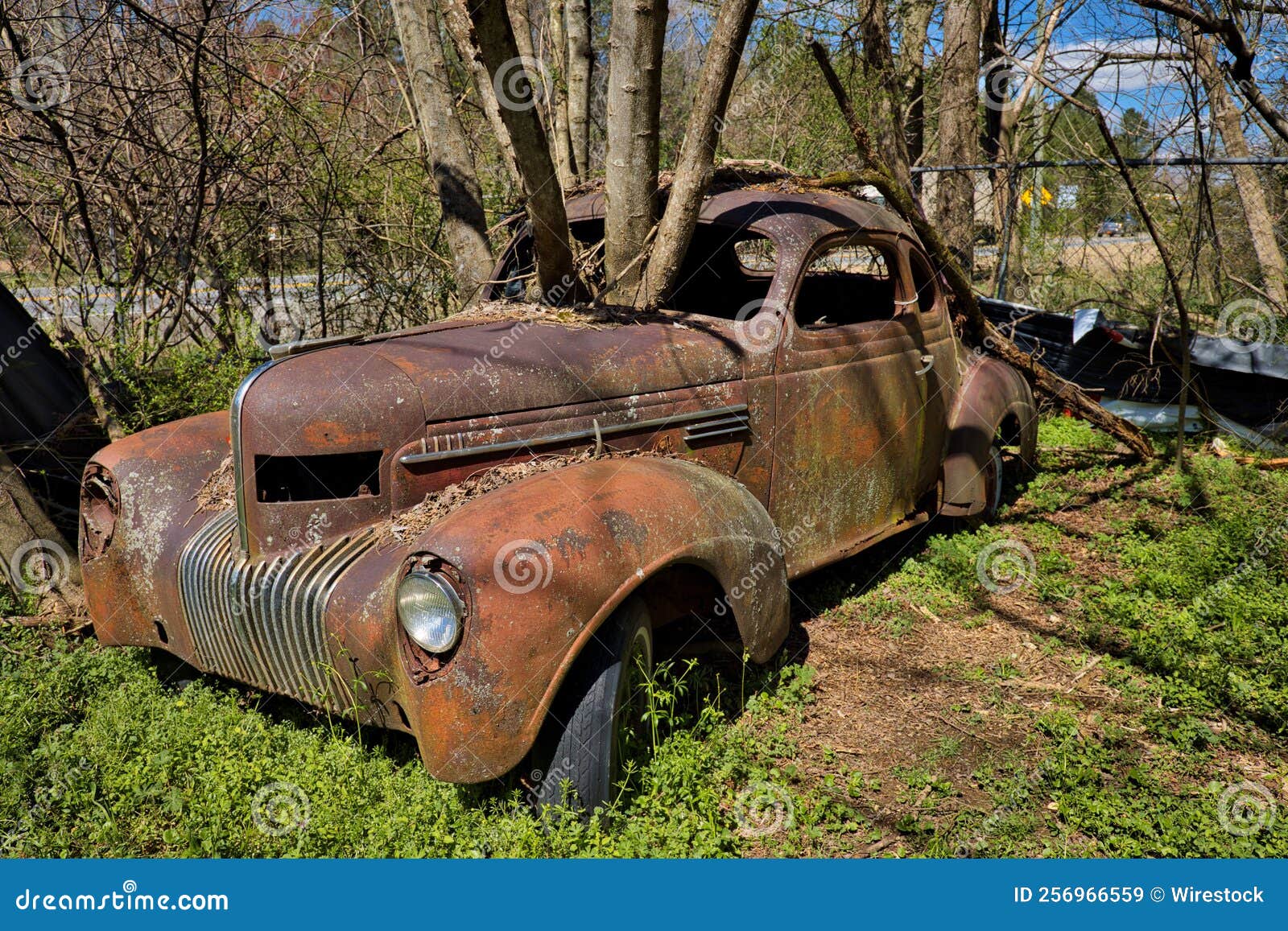 Frontal View of an Abandoned Rustic Car Parked Outside in the ...
