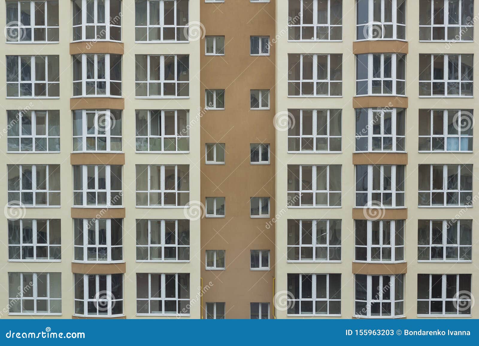 Frontal View of the Facade of Building with a Lot of Windows Stock ...