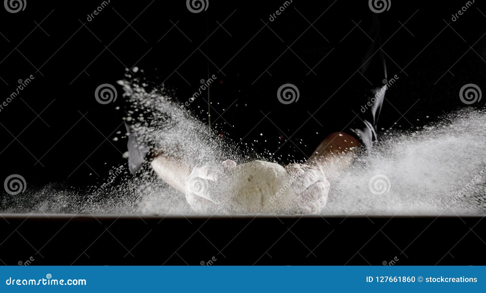 Frontal View of Man Dropping Dough Onto Table Stock Photo - Image of ...