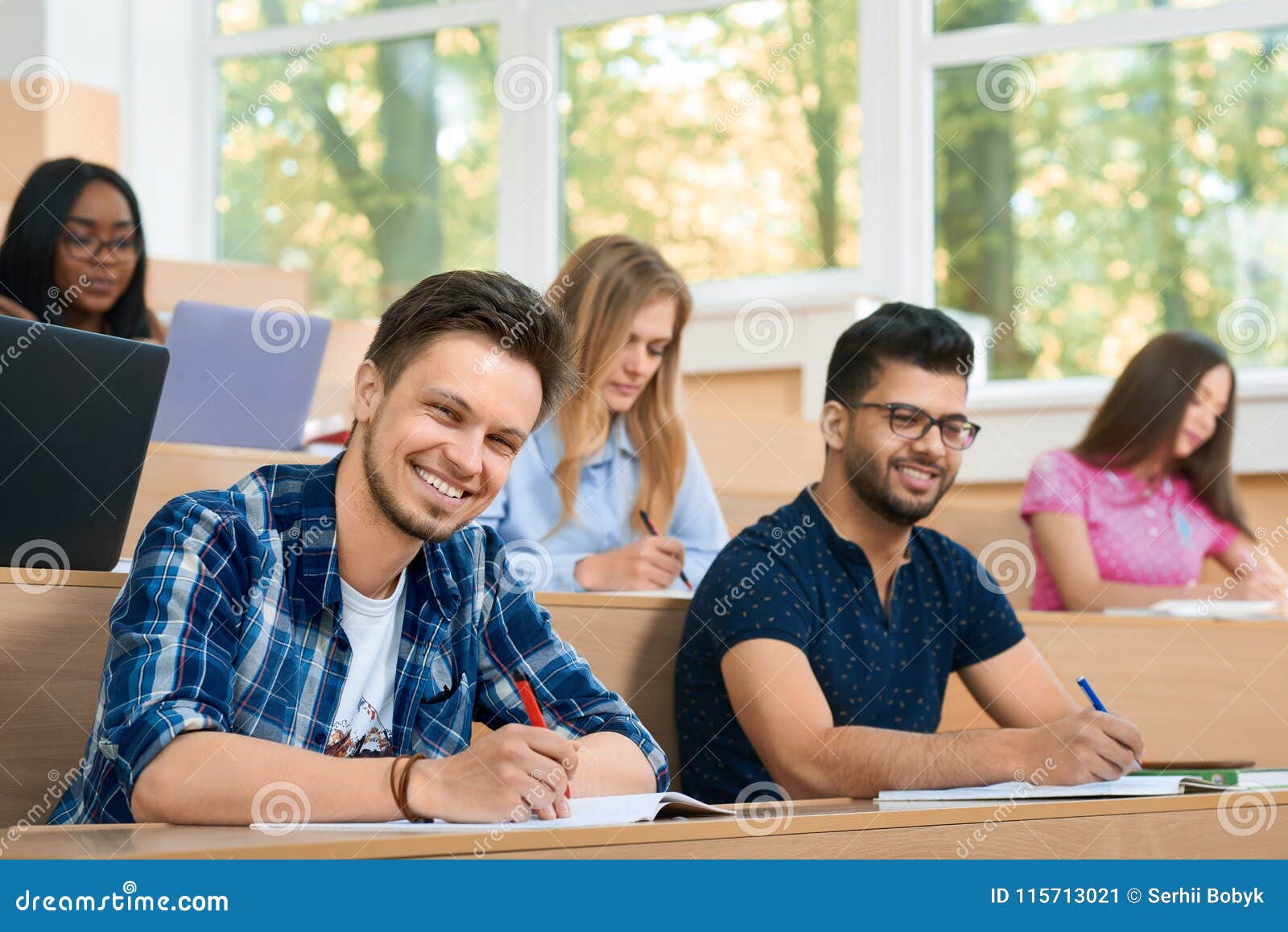 Frontview of Studuing during Lesson Students Looking at Camera. Stock ...
