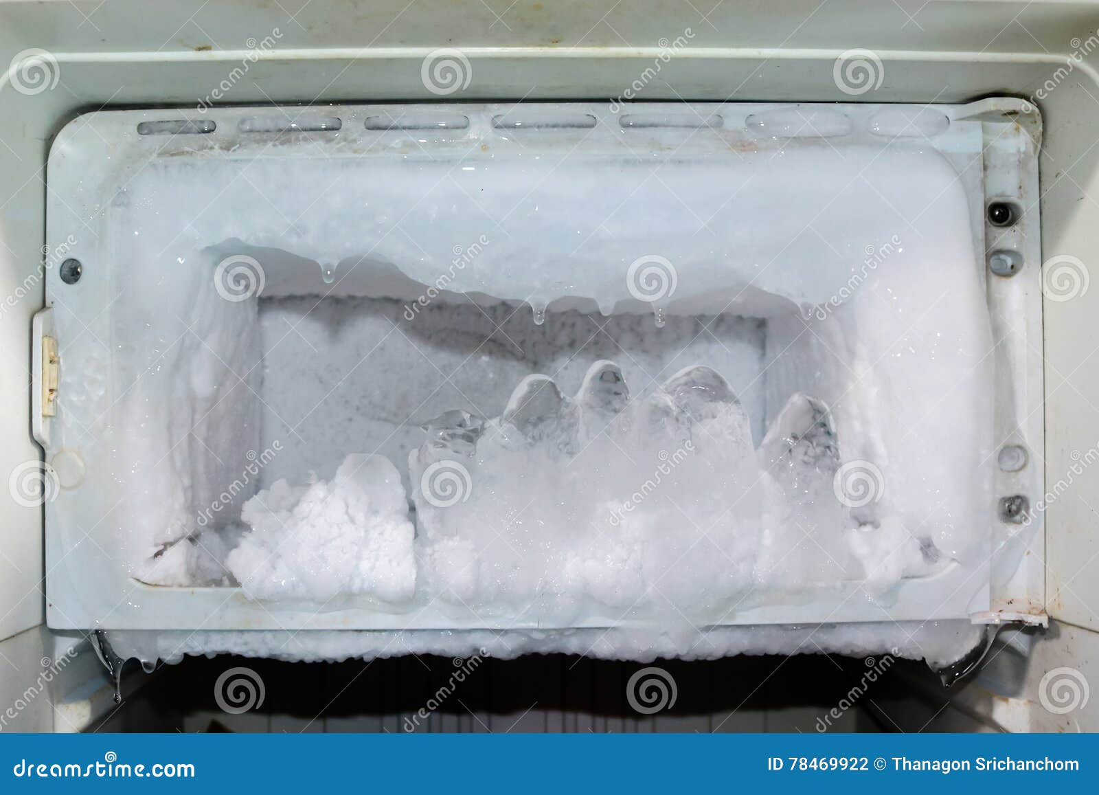 Frost in the fridge. stock photo. Image of alcoholic - 78469922