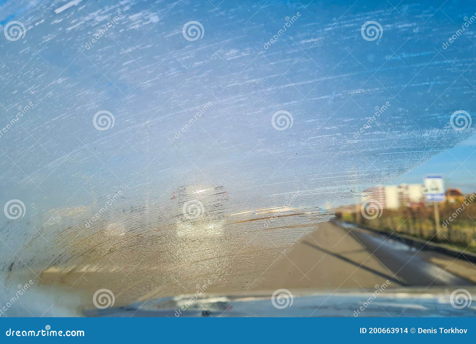 Frost on the Windshield of the Car while Driving on the Highway ...