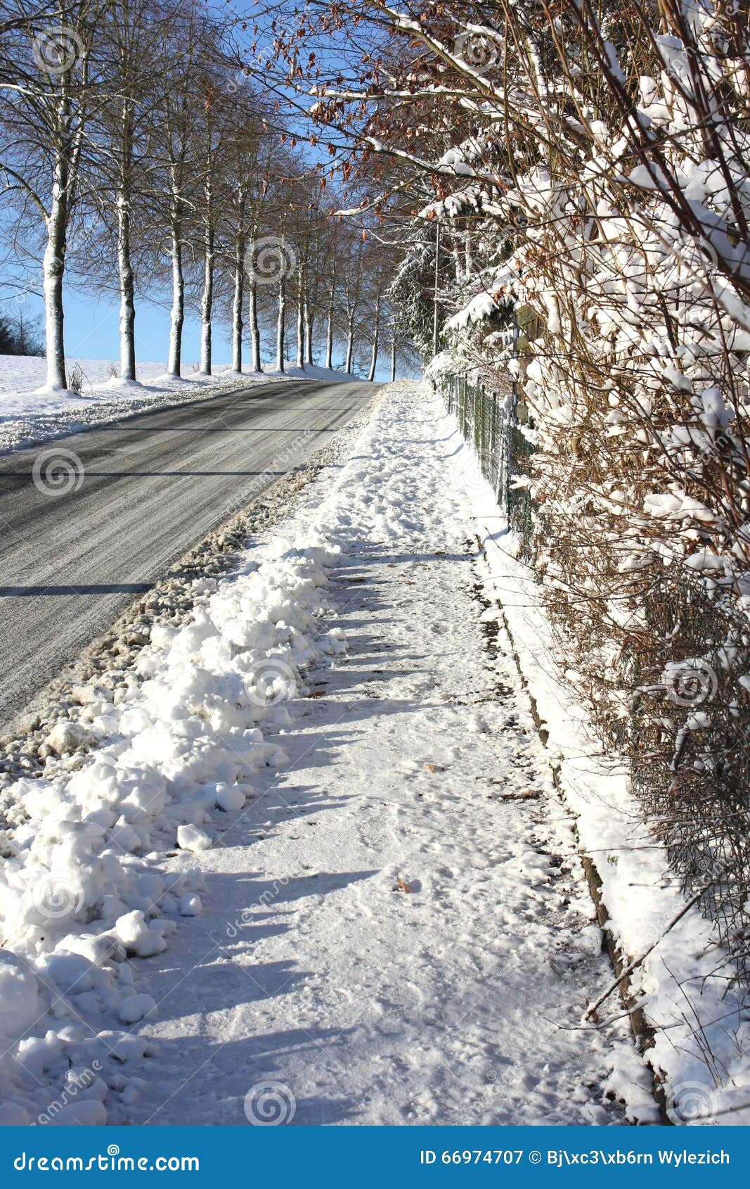 Frosted sidewalk stock image. Image of black, slide, snow - 66974707