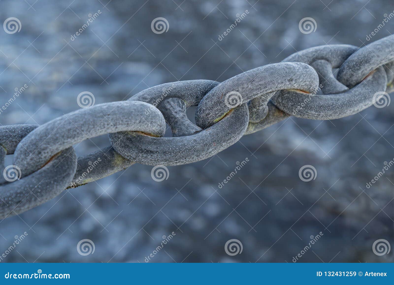 Frosty Iron Chain, Blue Water Flowing in the Background Stock Image ...