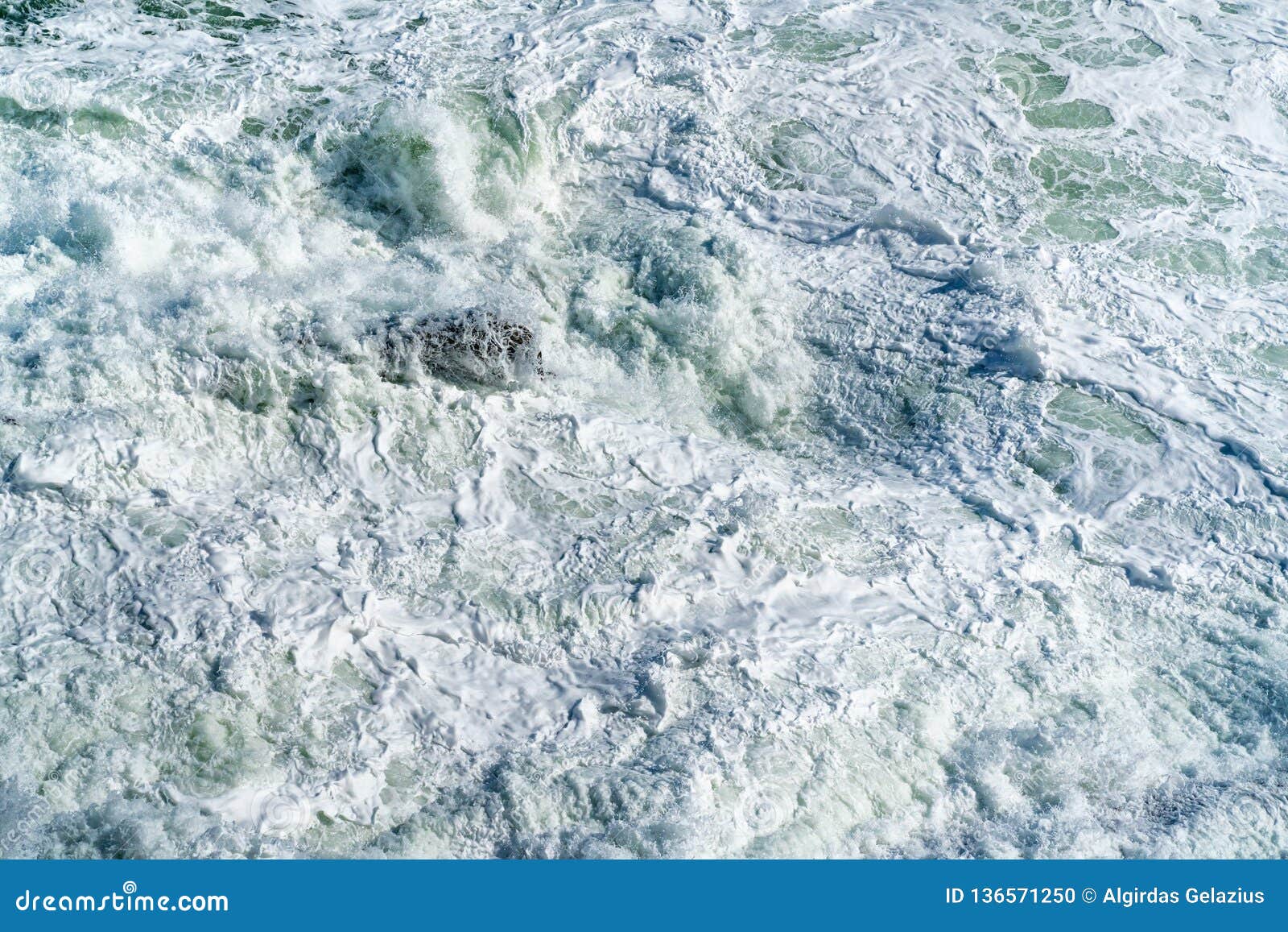 The frothy ocean water stock photo. Image of wall, background - 136571250