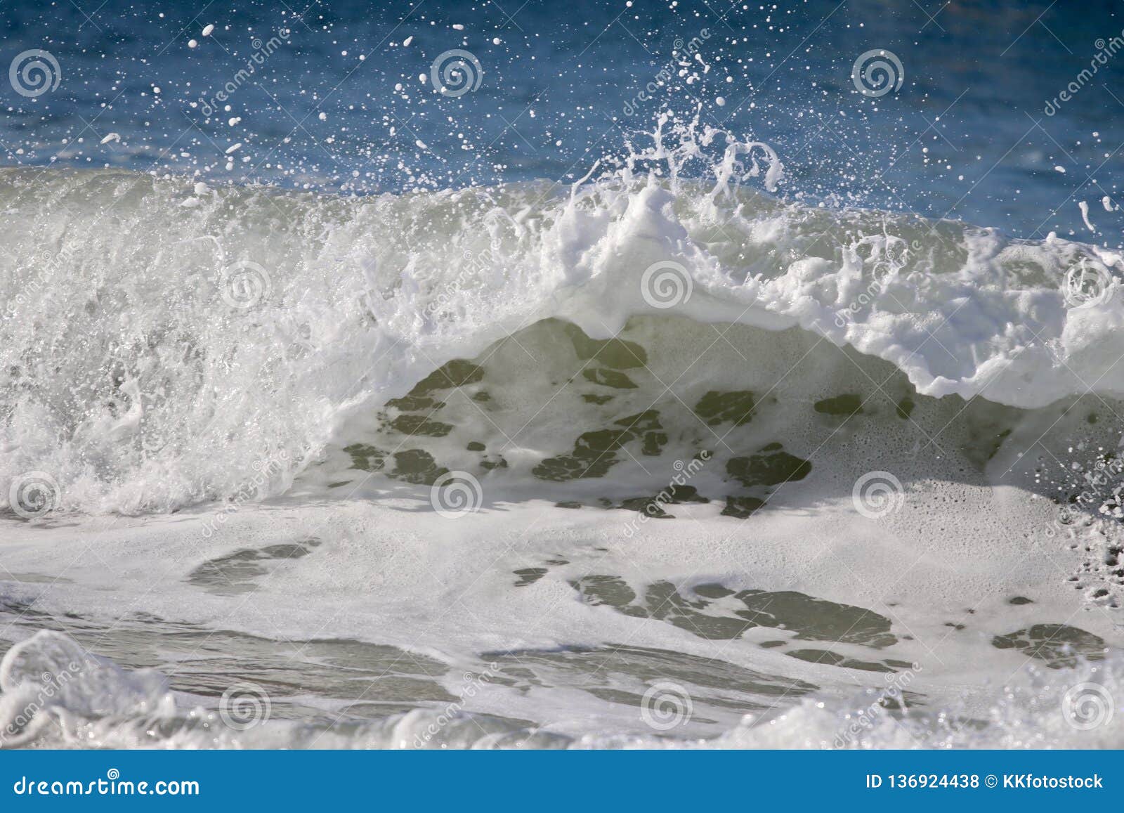 Frothy wave on blue ocean stock photo. Image of bright - 136924438