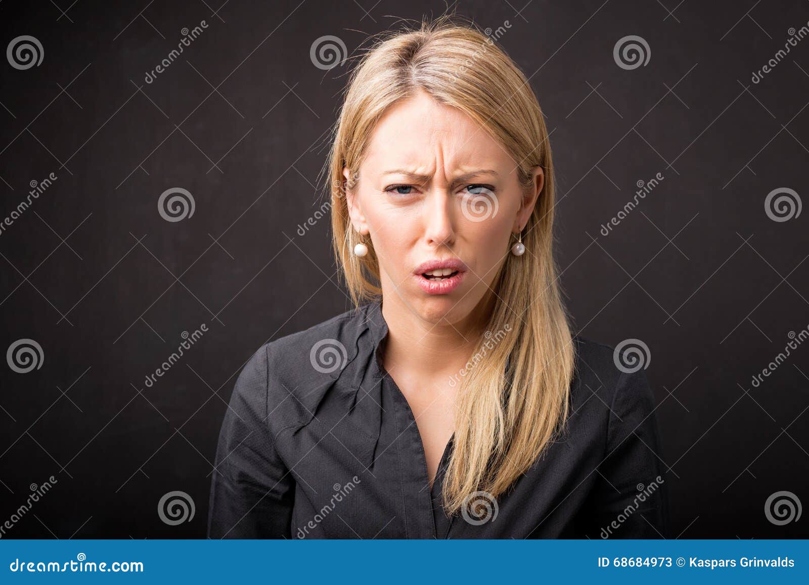 Frowned woman stock image. Image of face, adult, disbelief - 68684973