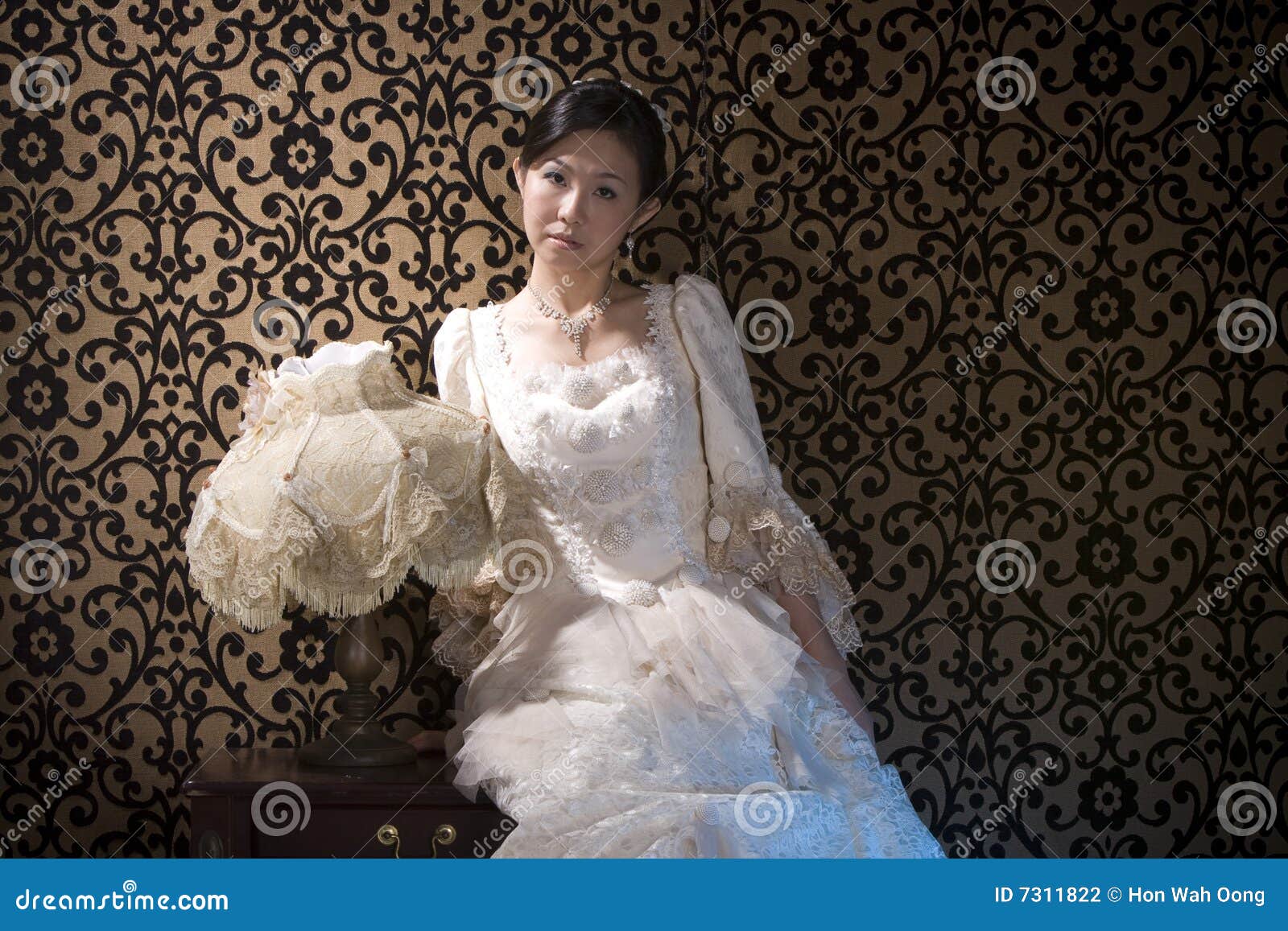 Frowning asian lady stock photo. Image of thoughts, lost - 7311822