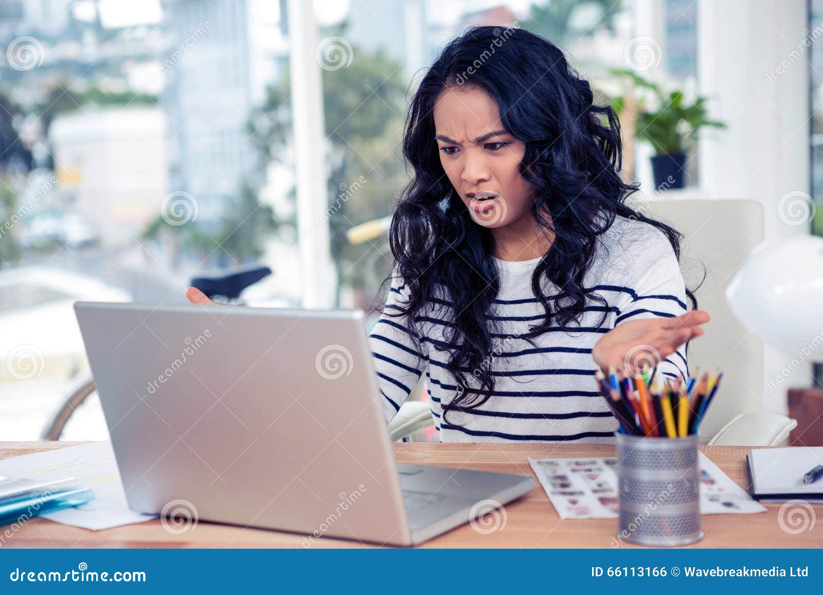 Frowning Asian Woman Looking at Laptop Stock Photo - Image of confusion ...