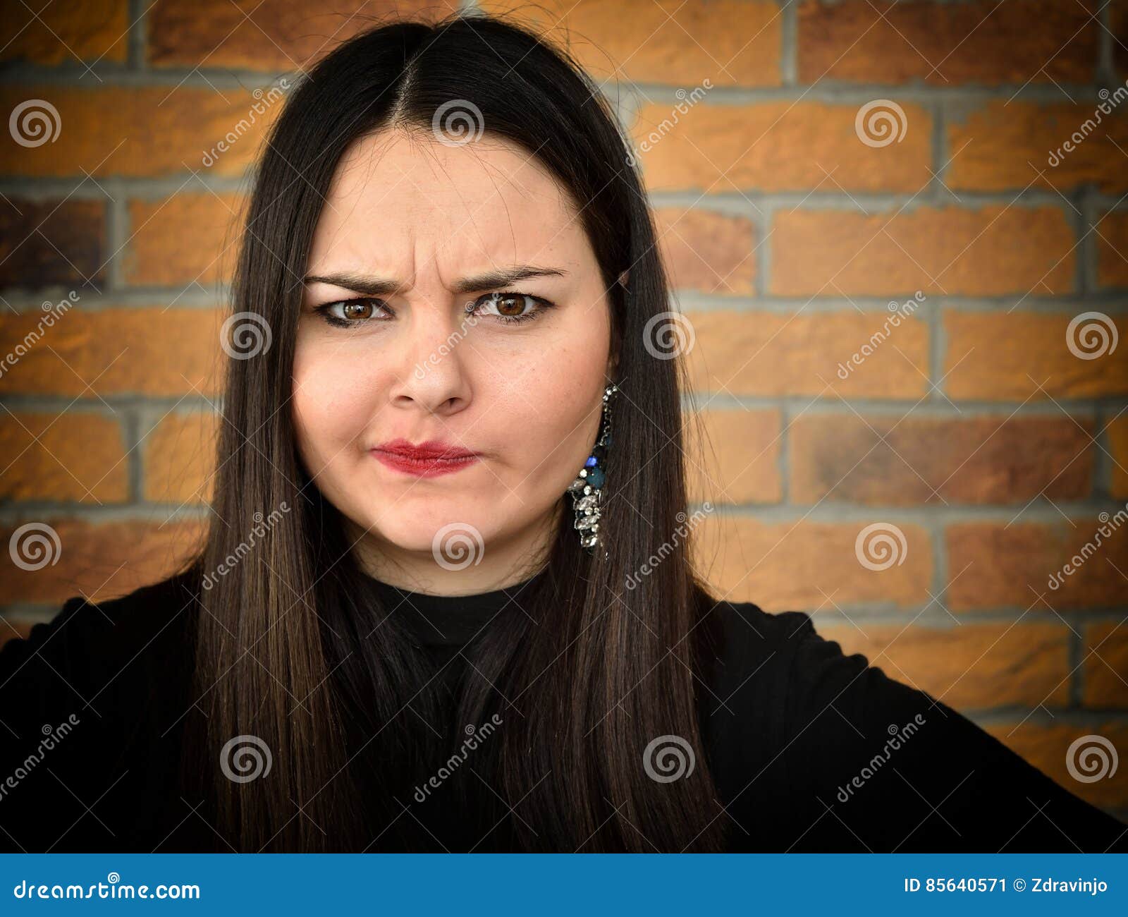 Frowning Beautiful Young Woman Stock Image - Image of businesswoman ...