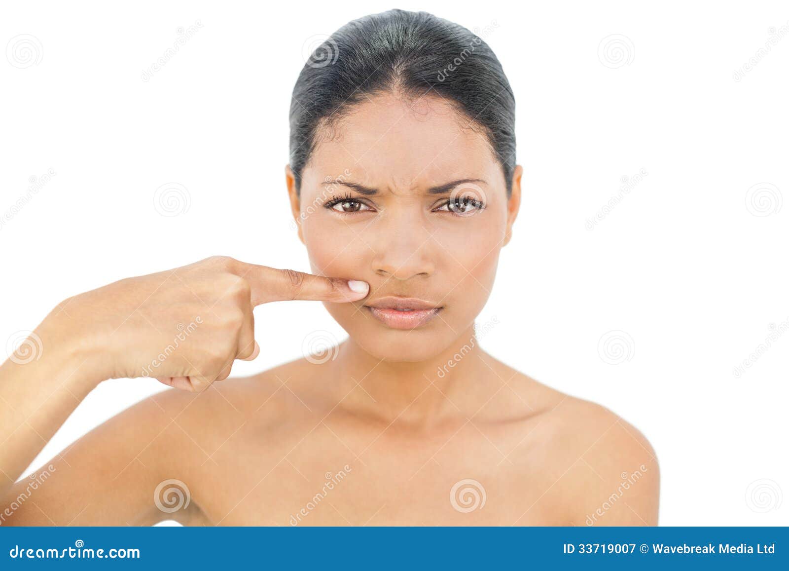 Frowning Black Haired Model Pointing Above Her Lips Stock Image - Image ...