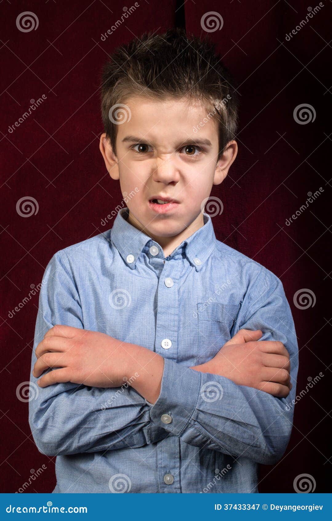 Frowning boy stock image. Image of hair, angry, caucasian - 37433347