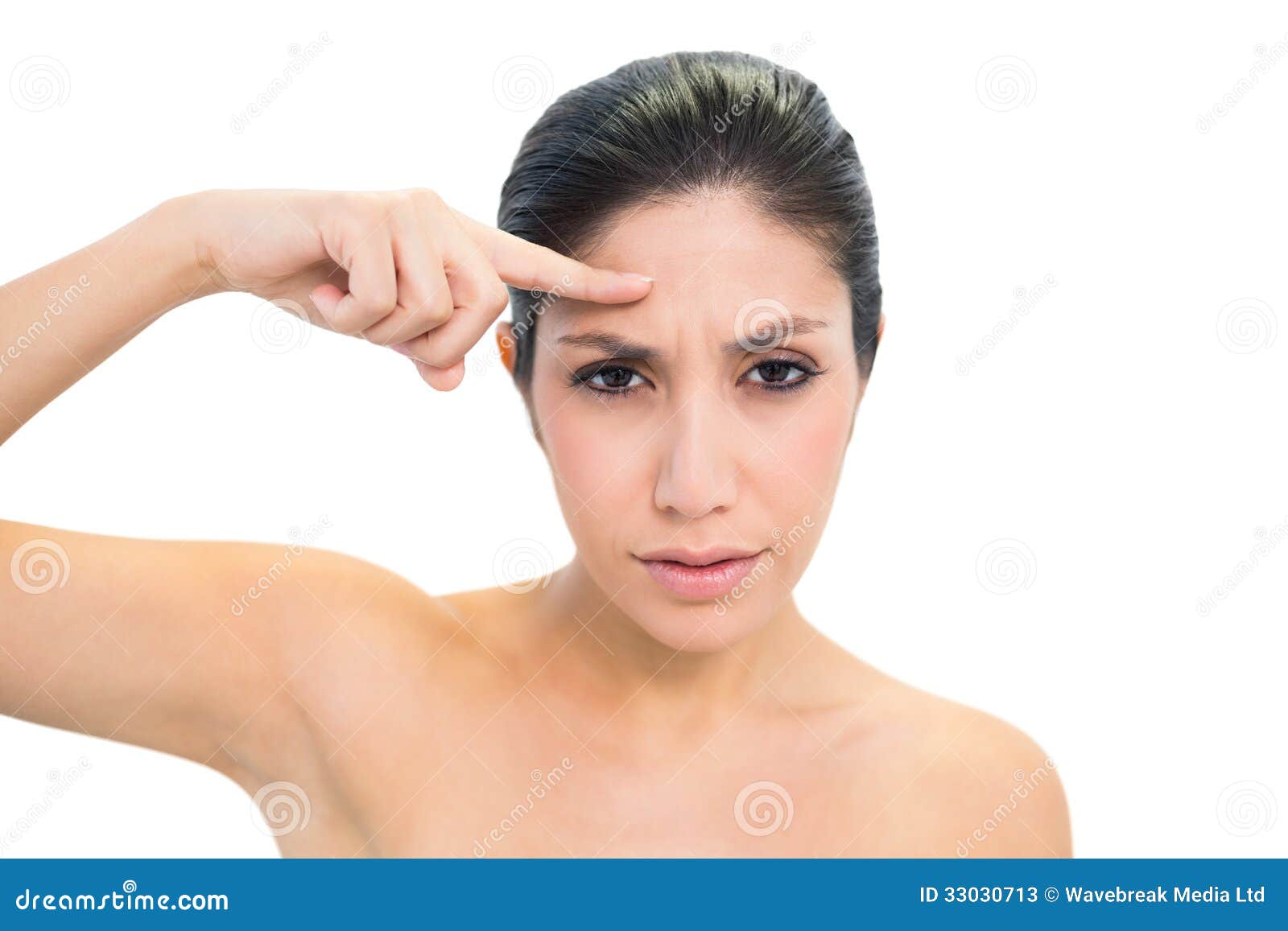 Frowning Brunette With A Headache Looking At Camera Royalty-Free Stock ...