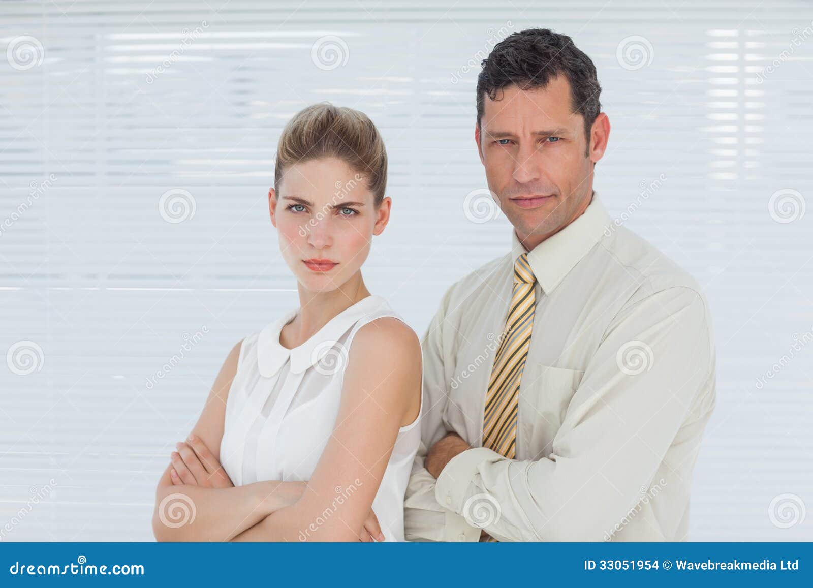 Frowning Coworkers Posing Together Stock Photo - Image of adult, arms ...