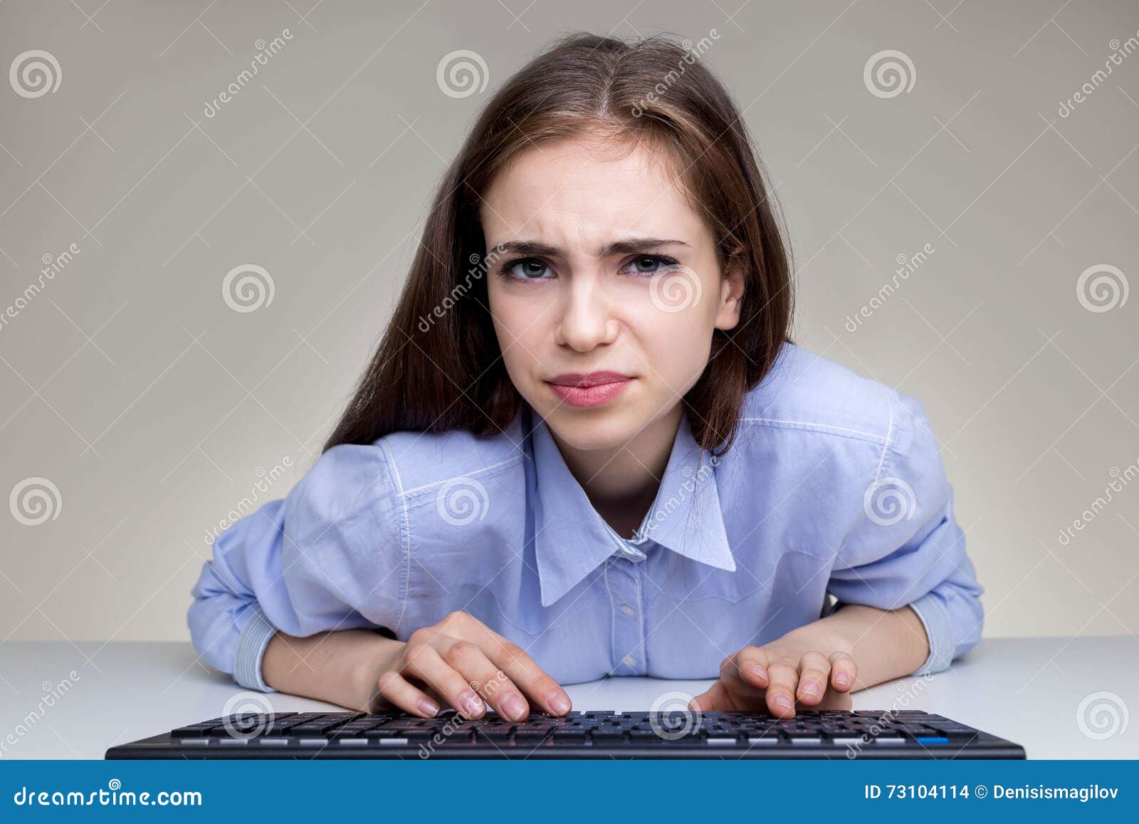 Frowning Female Using Keyboard Stock Photo - Image of information ...