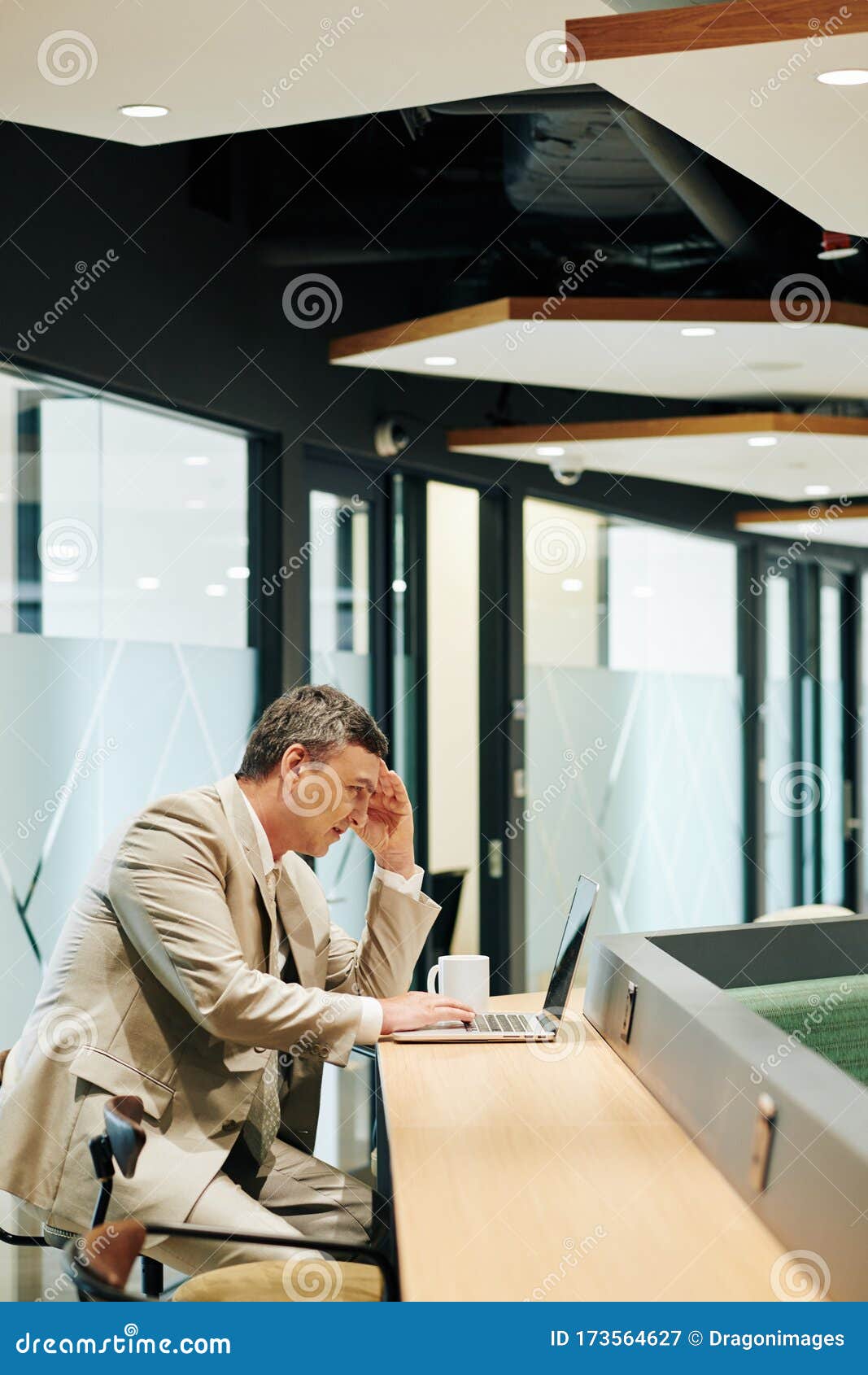 Businessman Reading Confusing Report Stock Image - Image of mature ...