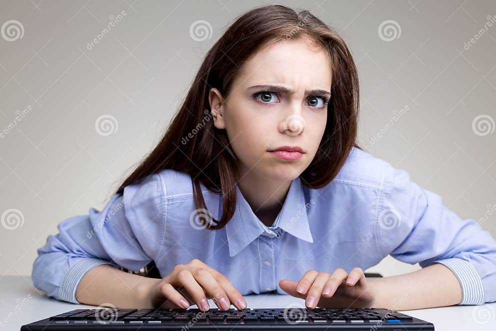 Frowning Woman Using Keyboard Stock Image - Image of beautiful, desktop ...
