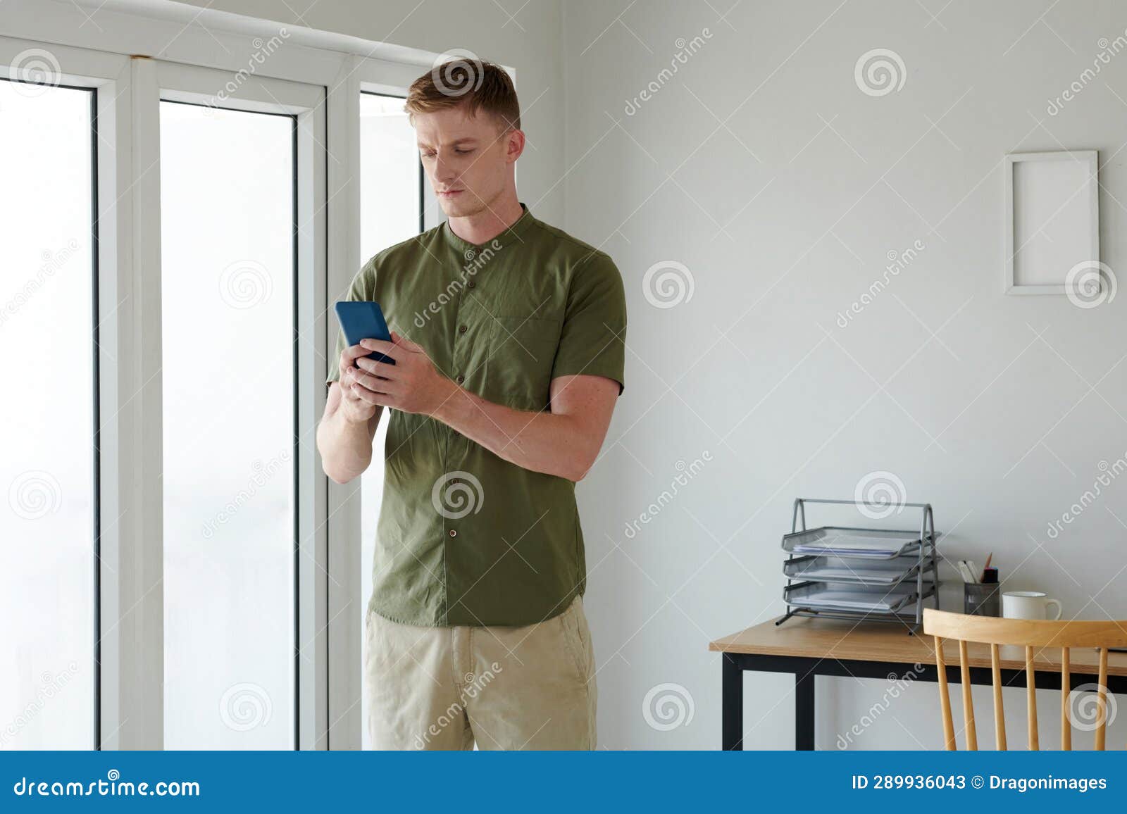 Young Man Checking Text Messages Stock Image - Image of businessman ... Young Man Checking Text Messages Stock Image - Image of businessman ...