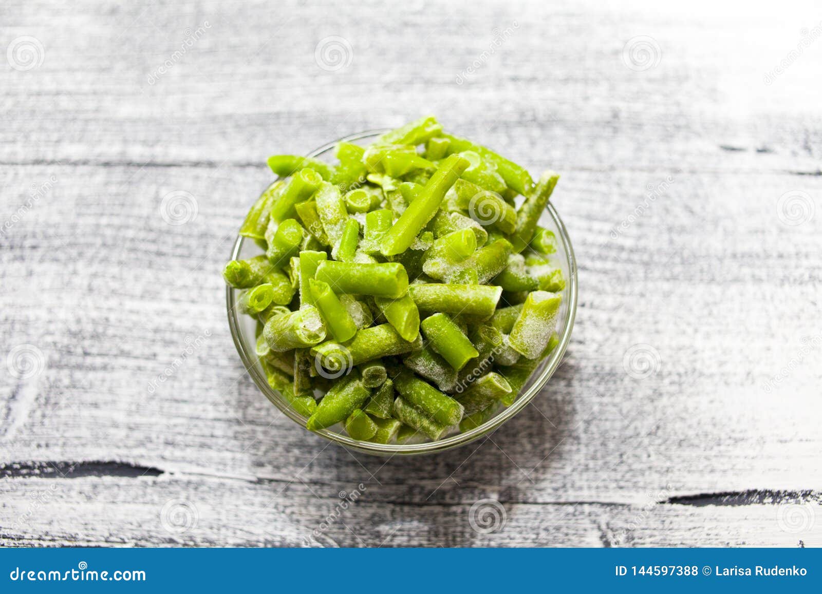 Frozen Beans Glass Bowl With Frozen Green Beans On Beautiful Wooden