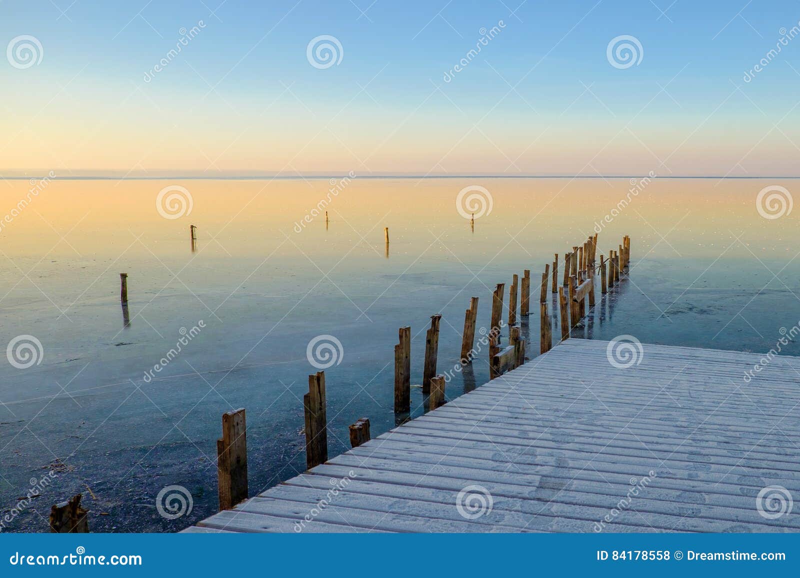 Frozen boat dock on a lake stock photo. Image of cold - 84178558