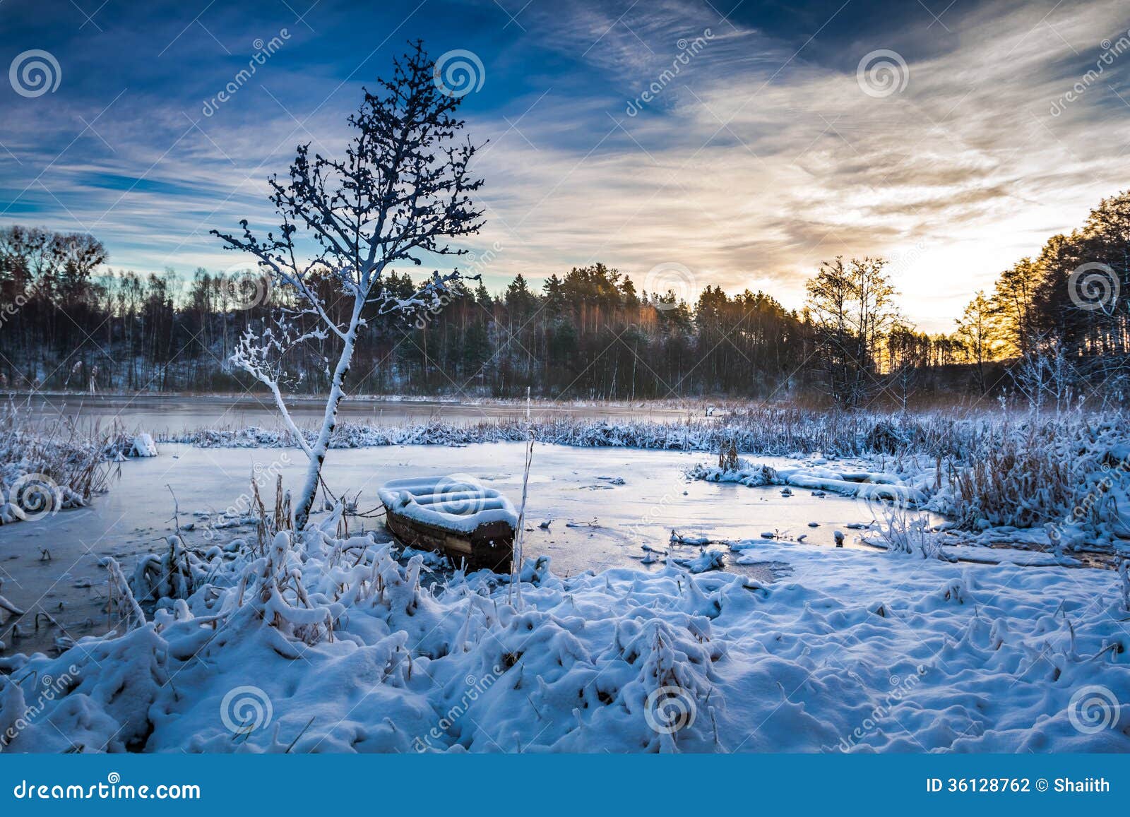 Frozen Boat on the Lake at Sunrise Stock Photo - Image of frozen ...
