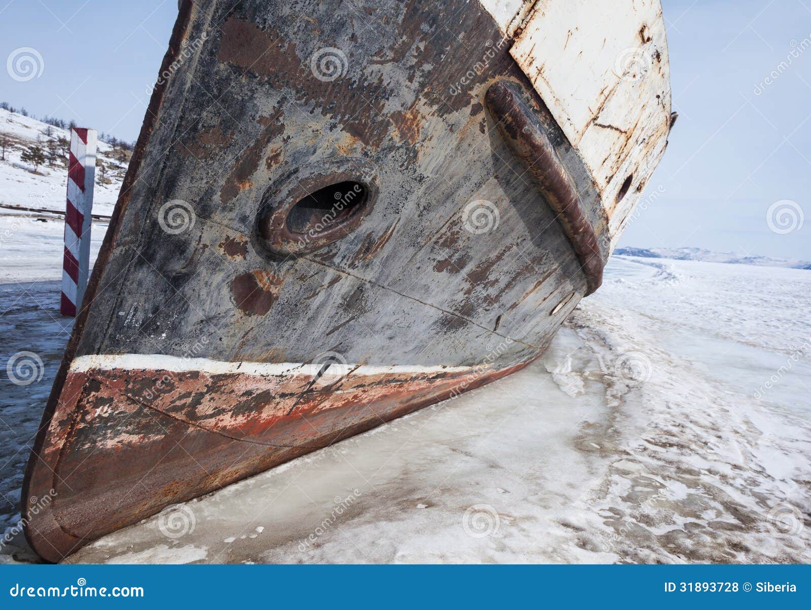 Frozen boat at the shore stock photo. Image of moorage - 31893728