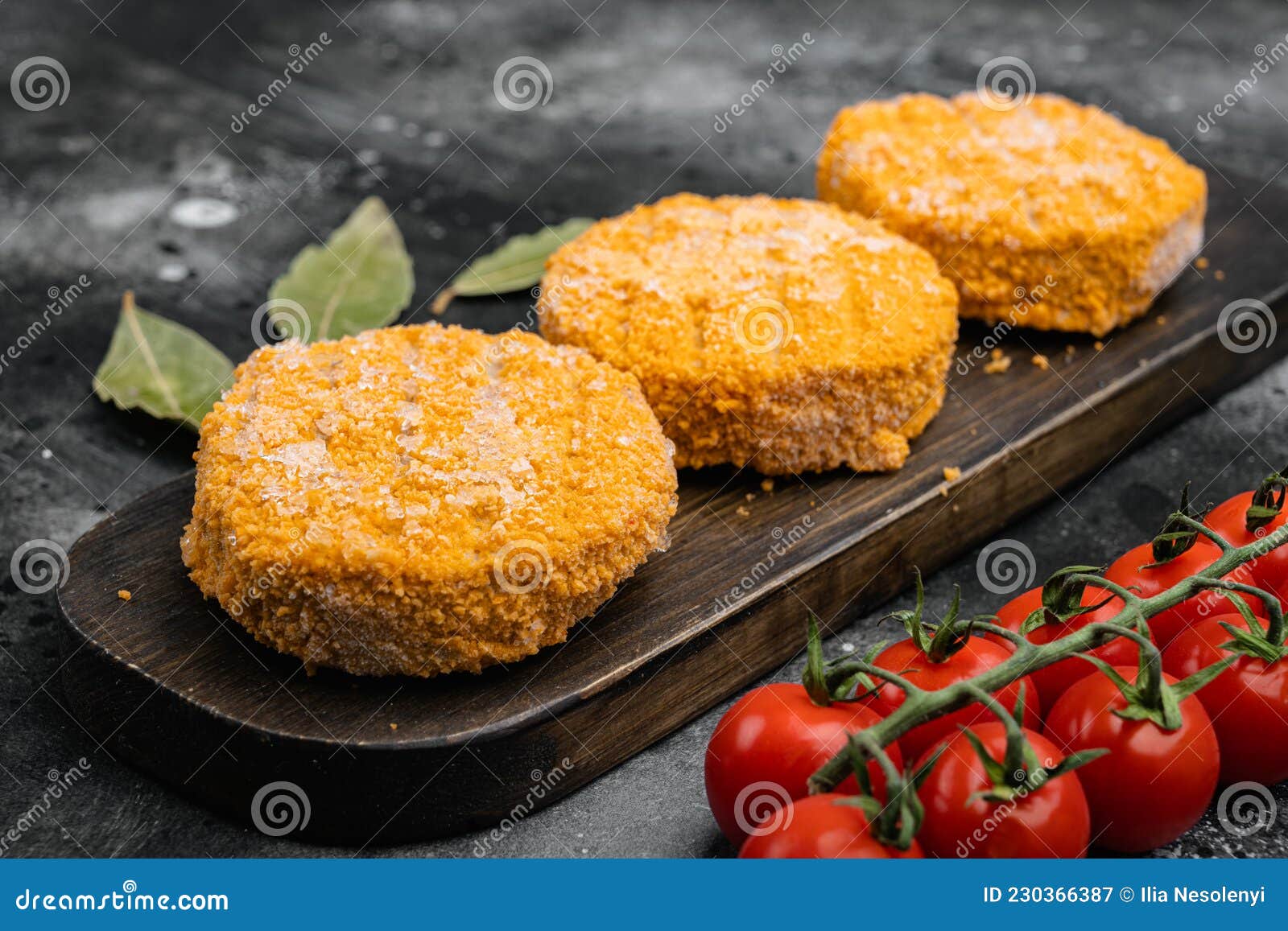 Frozen Breaded Fish Patties, on Black Dark Stone Table Background Stock ...