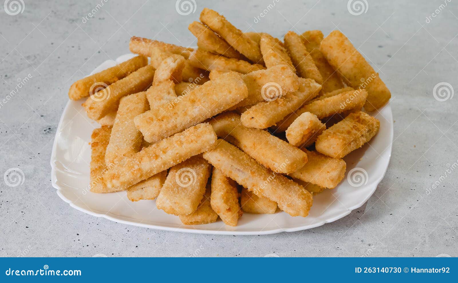 Frozen Breaded Fish Sticks Close-up on a Plate Stock Photo - Image of ...