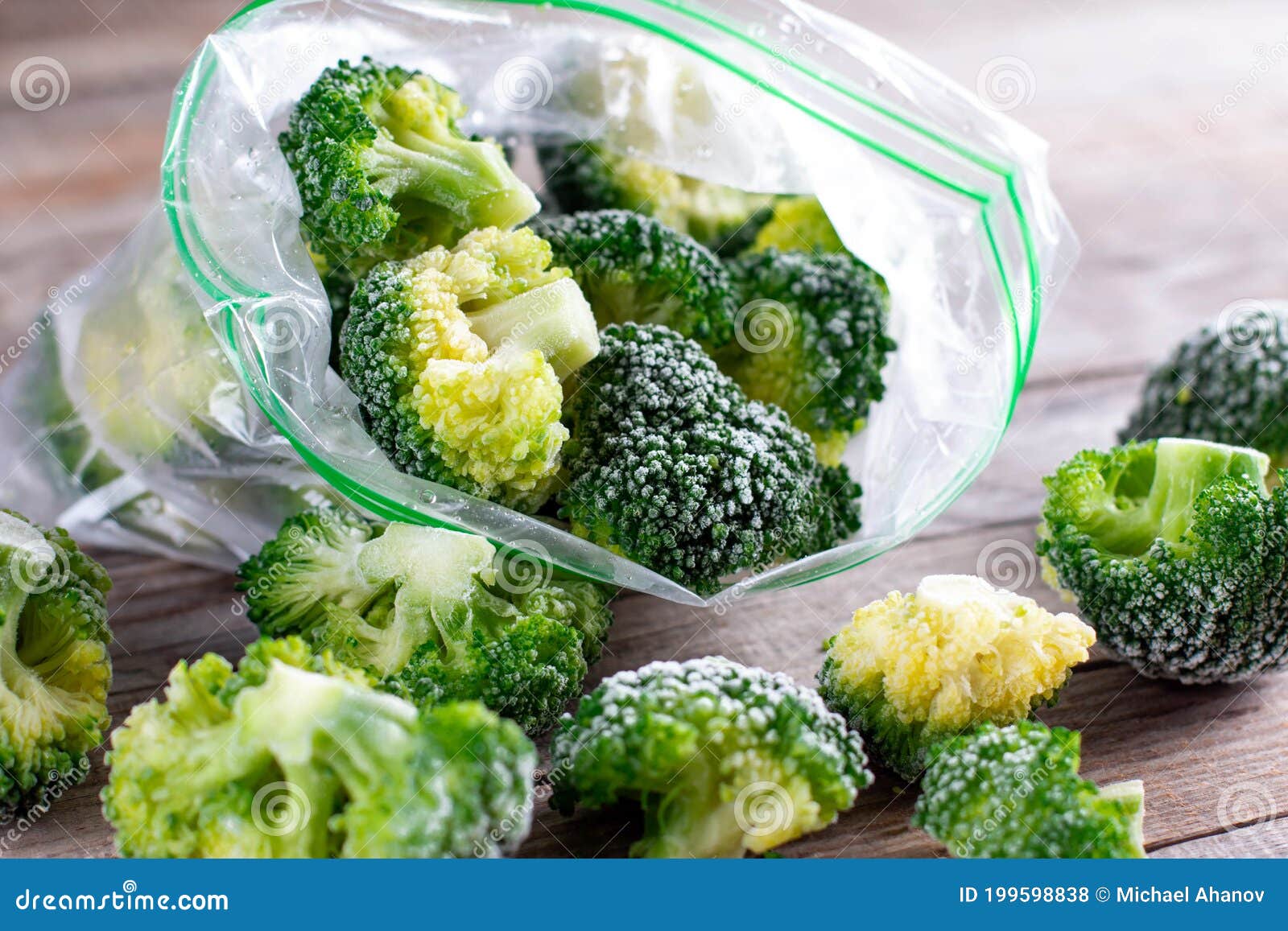 Frozen Broccoli in a Plastic Bag on Wooden Table. Selective Focus Stock ...
