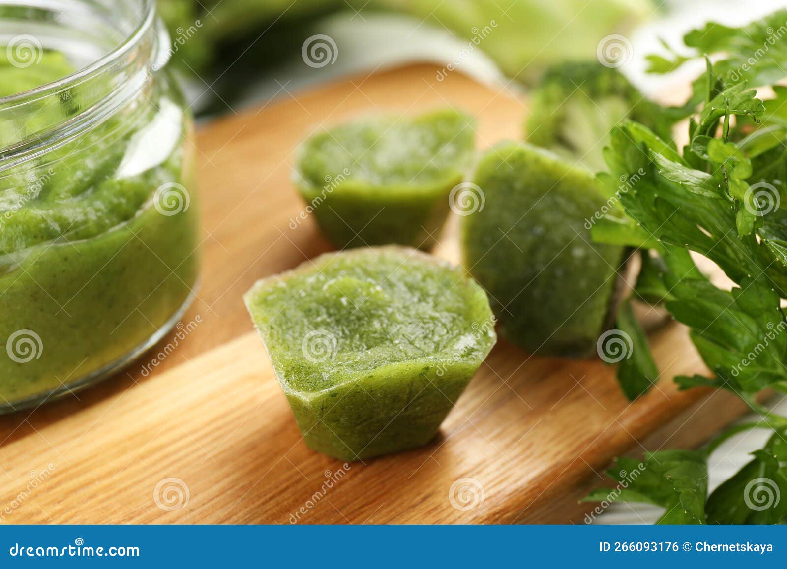 Frozen Broccoli Puree Cubes on Cutting Board Stock Photo - Image of ...