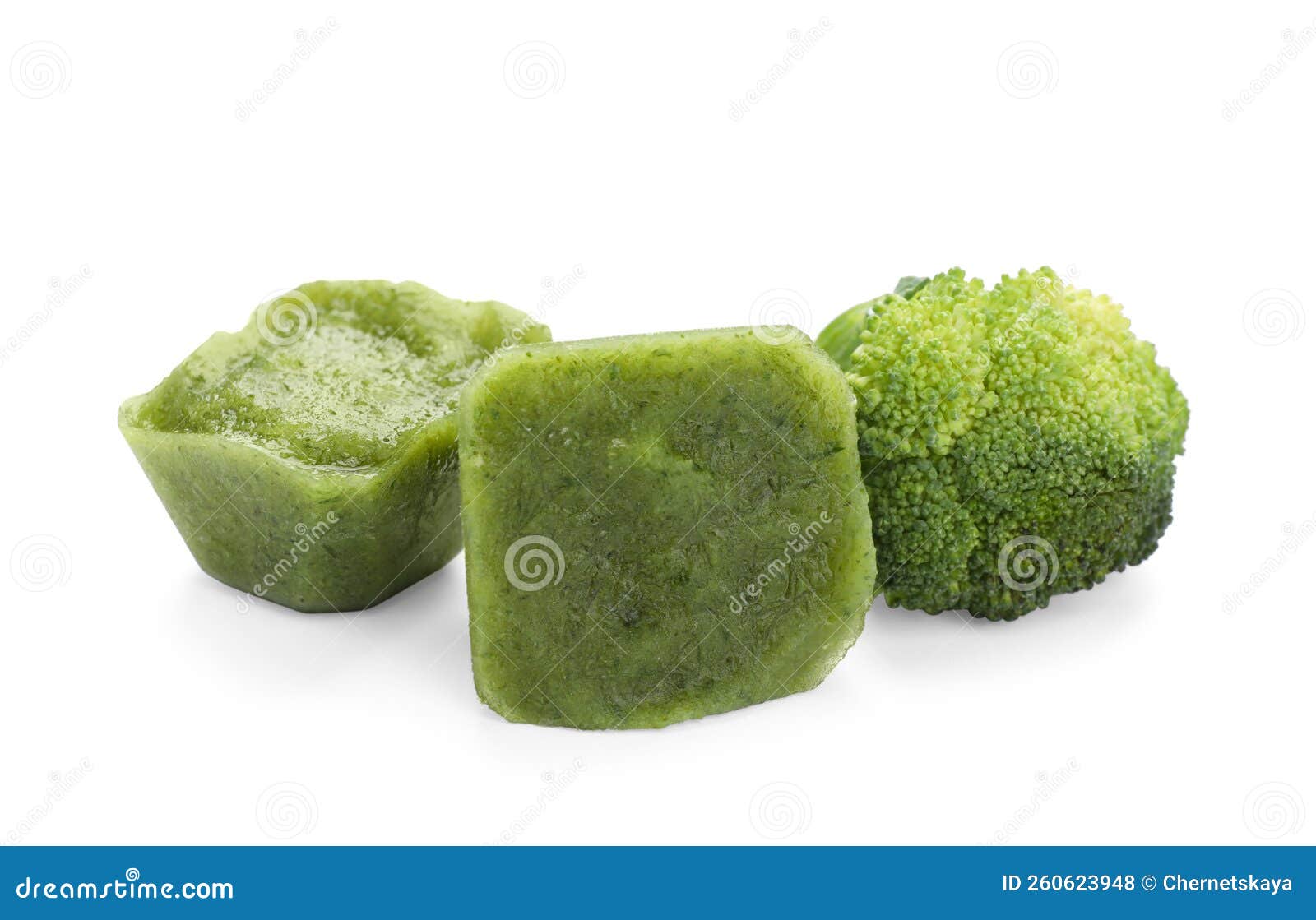 Frozen Broccoli Puree Cubes and Fresh Broccoli Isolated on White Stock ...